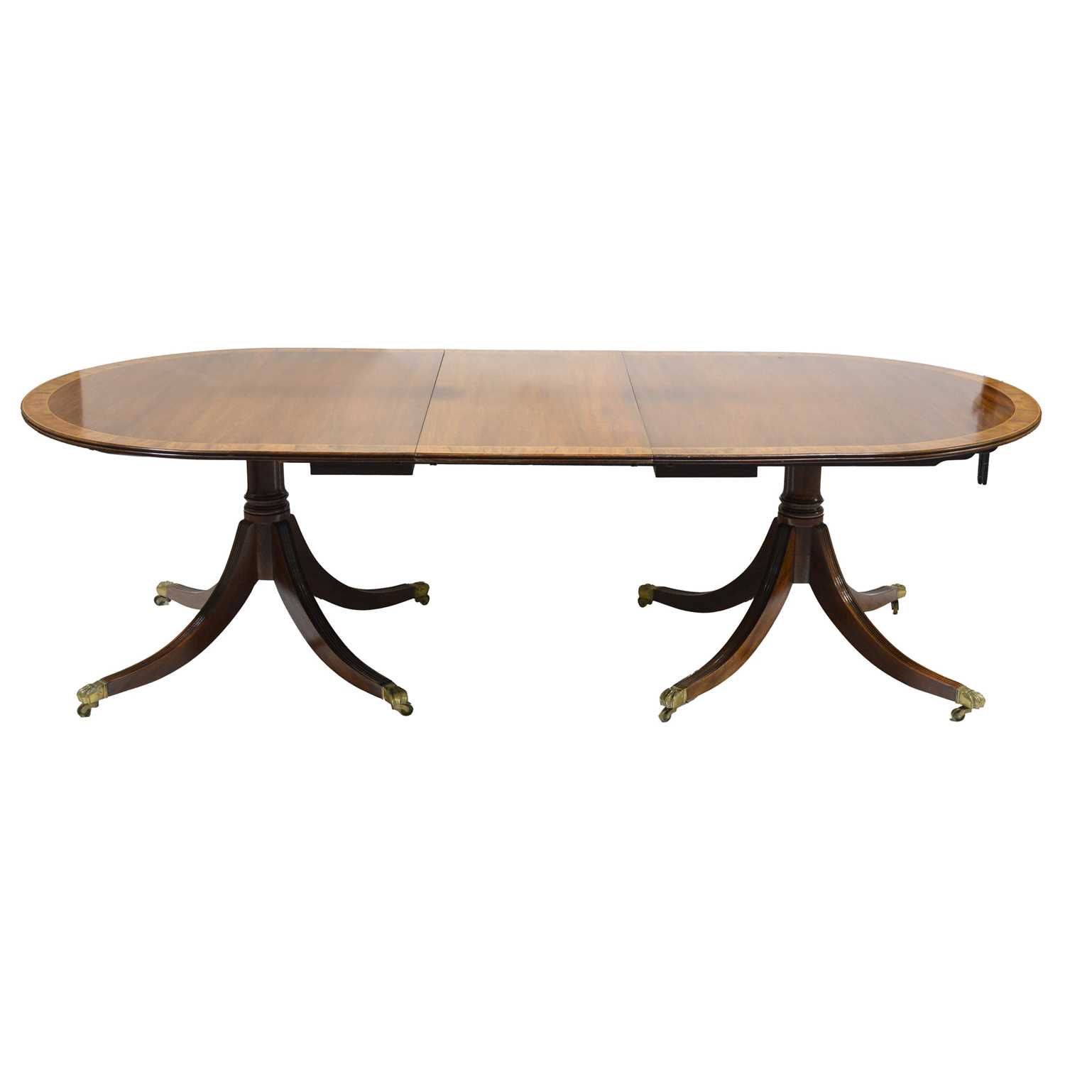 Lot 231 - Regency style mahogany extending dining