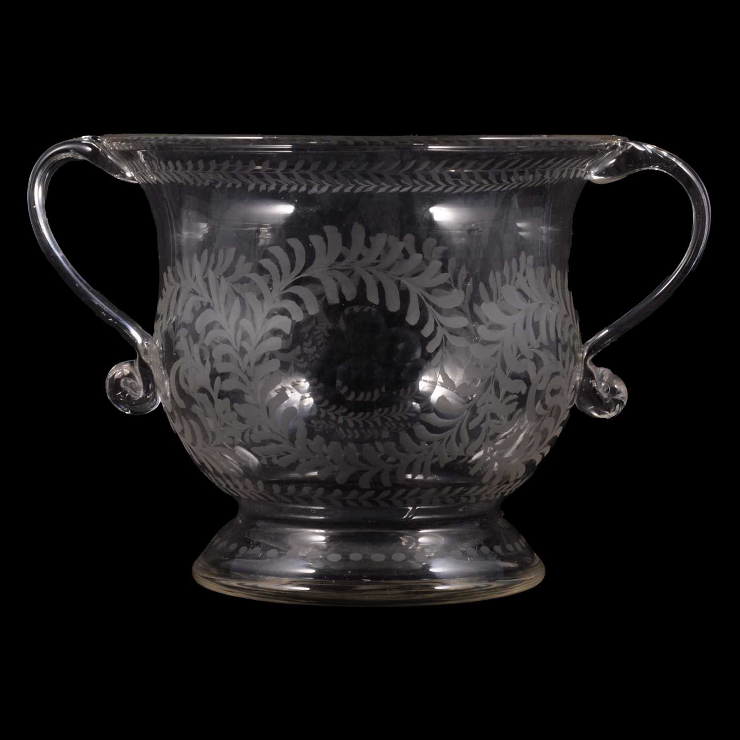 Lot 25 - Large twin-handled deep glass bowl, 19th