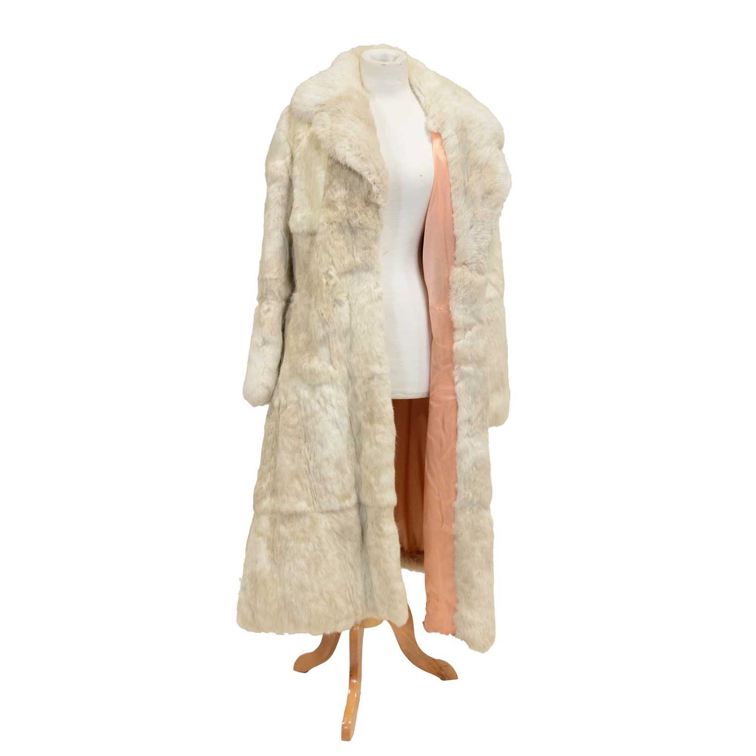 Lot 421 - A long white rabbit fur coat and an