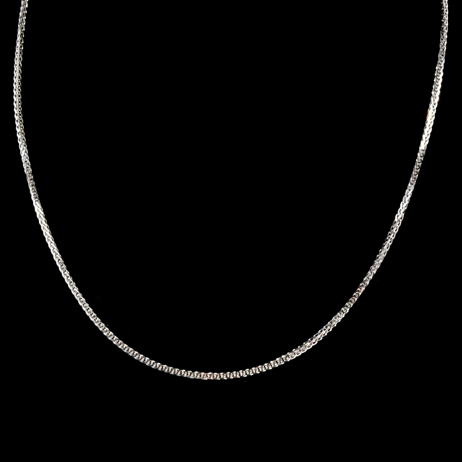 Lot 144 - A white metal neck chain marked 750.