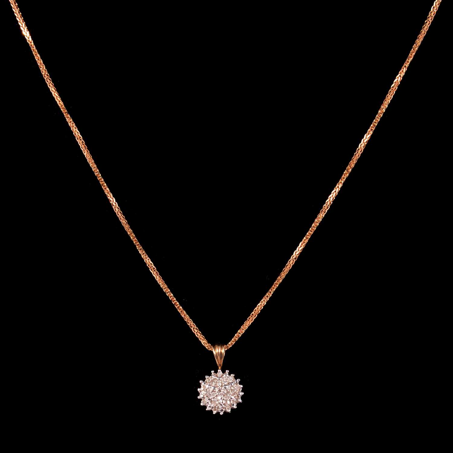 Lot 172 - A diamond cluster pendant and chain.