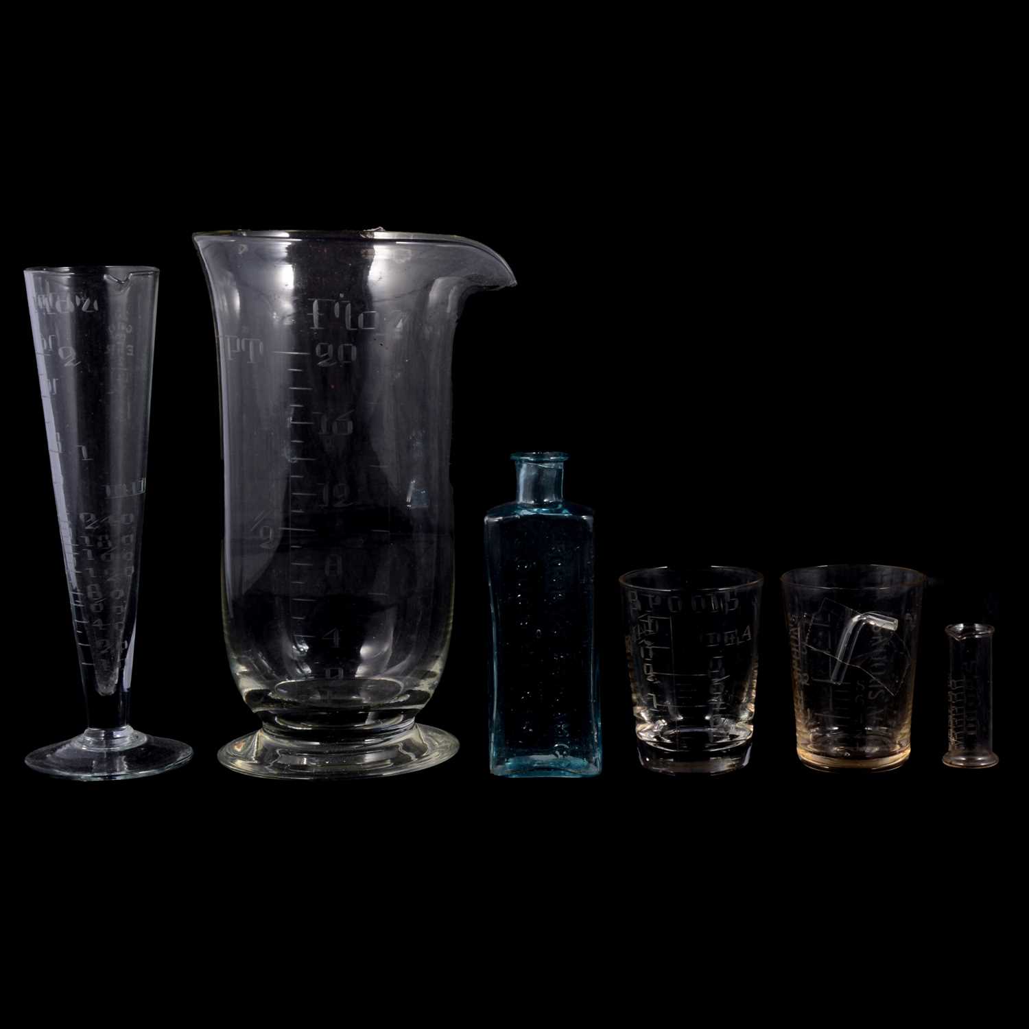 Lot 132 - Collection of measuring glasses and eye