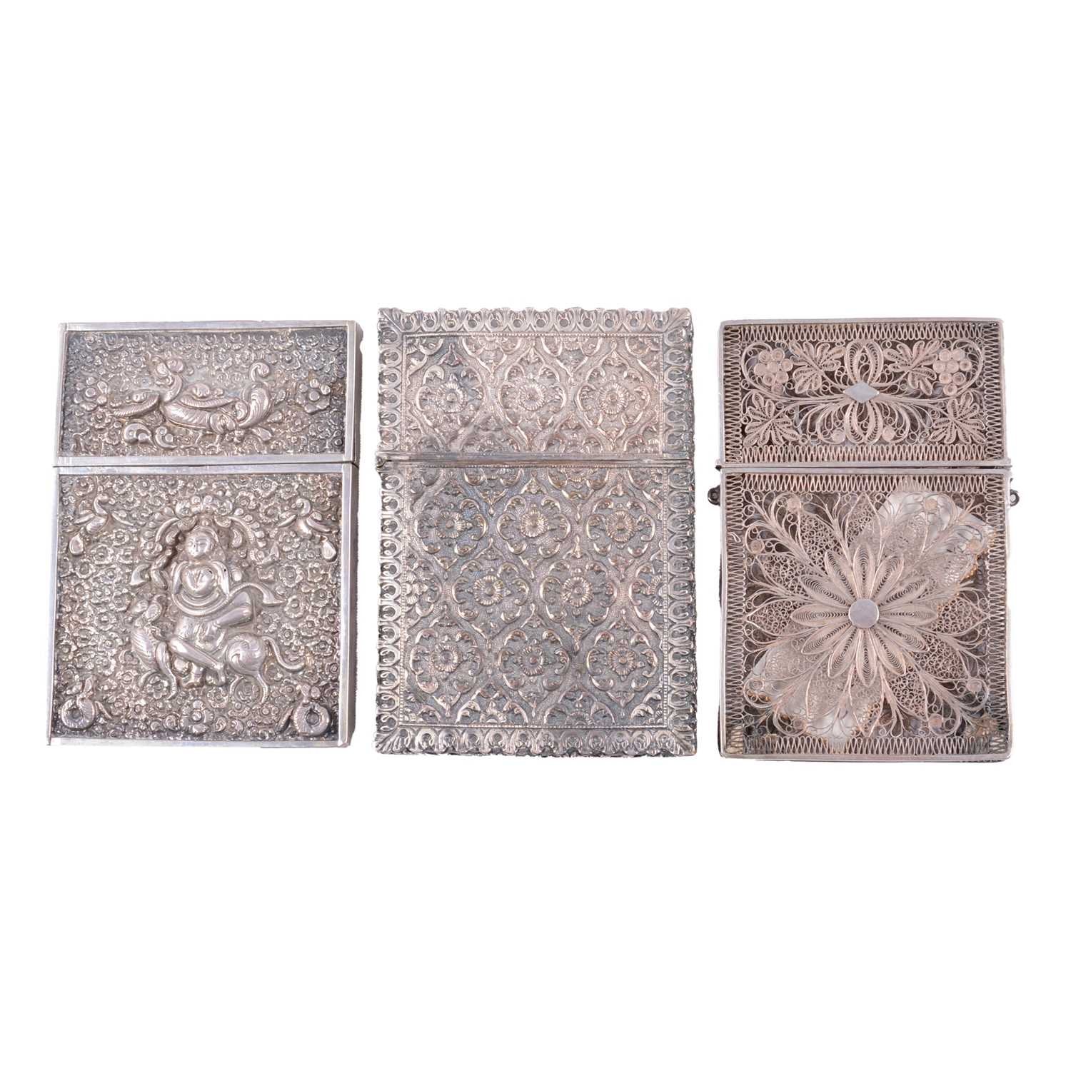 Lot 282 - Three white metal or plated card cases,