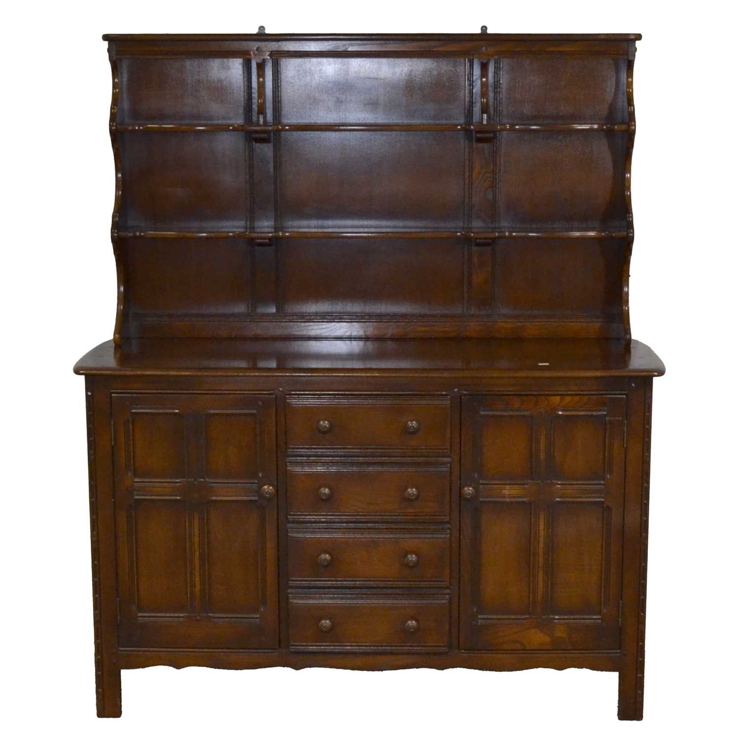 Lot 444 - Ercol dark elm Welsh dresser,