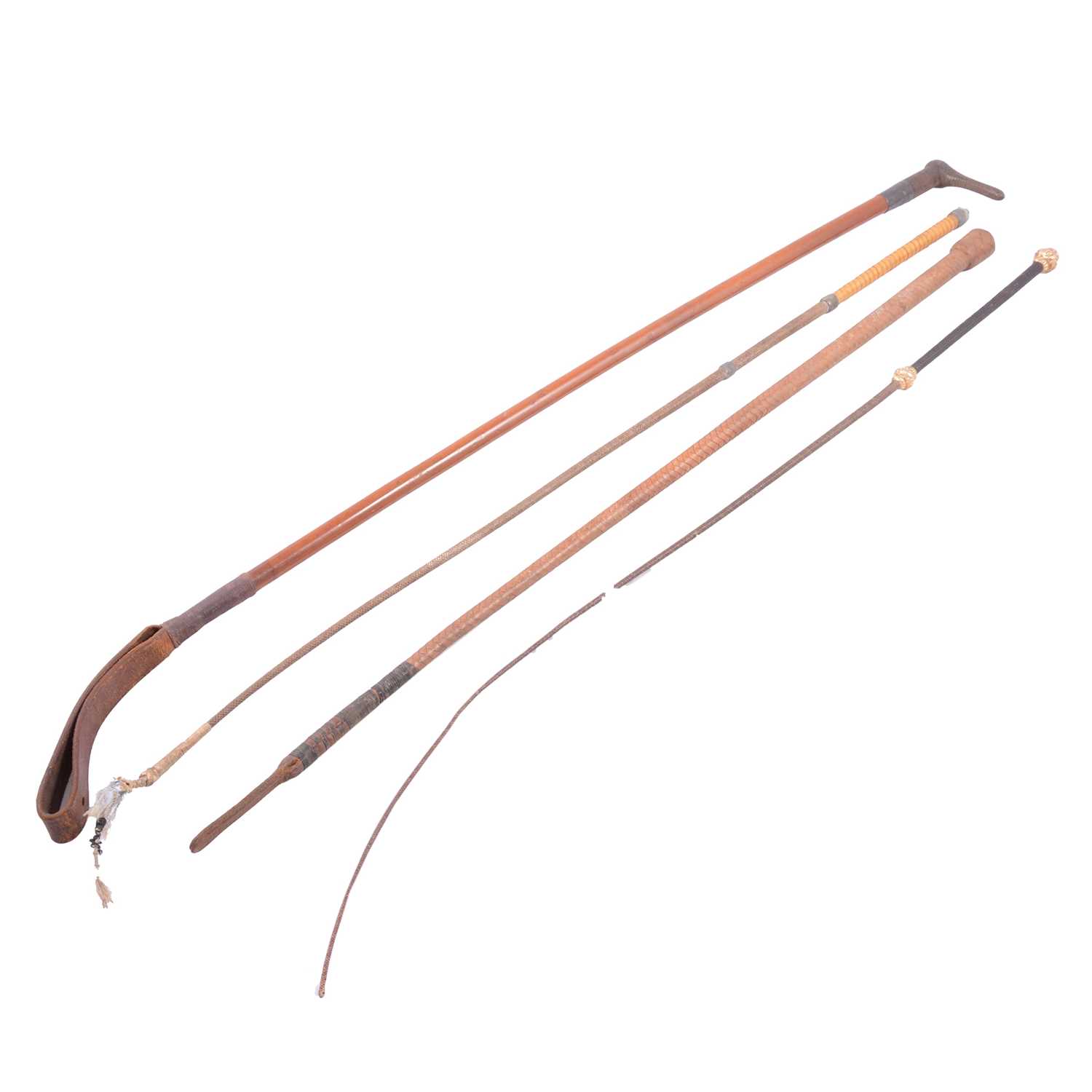 Lot 164 - Four riding crops and whips
