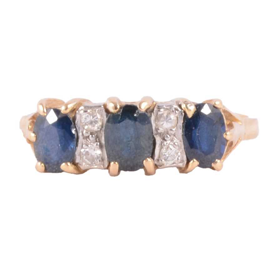 Lot 3 - A sapphire and diamond half hoop ring.