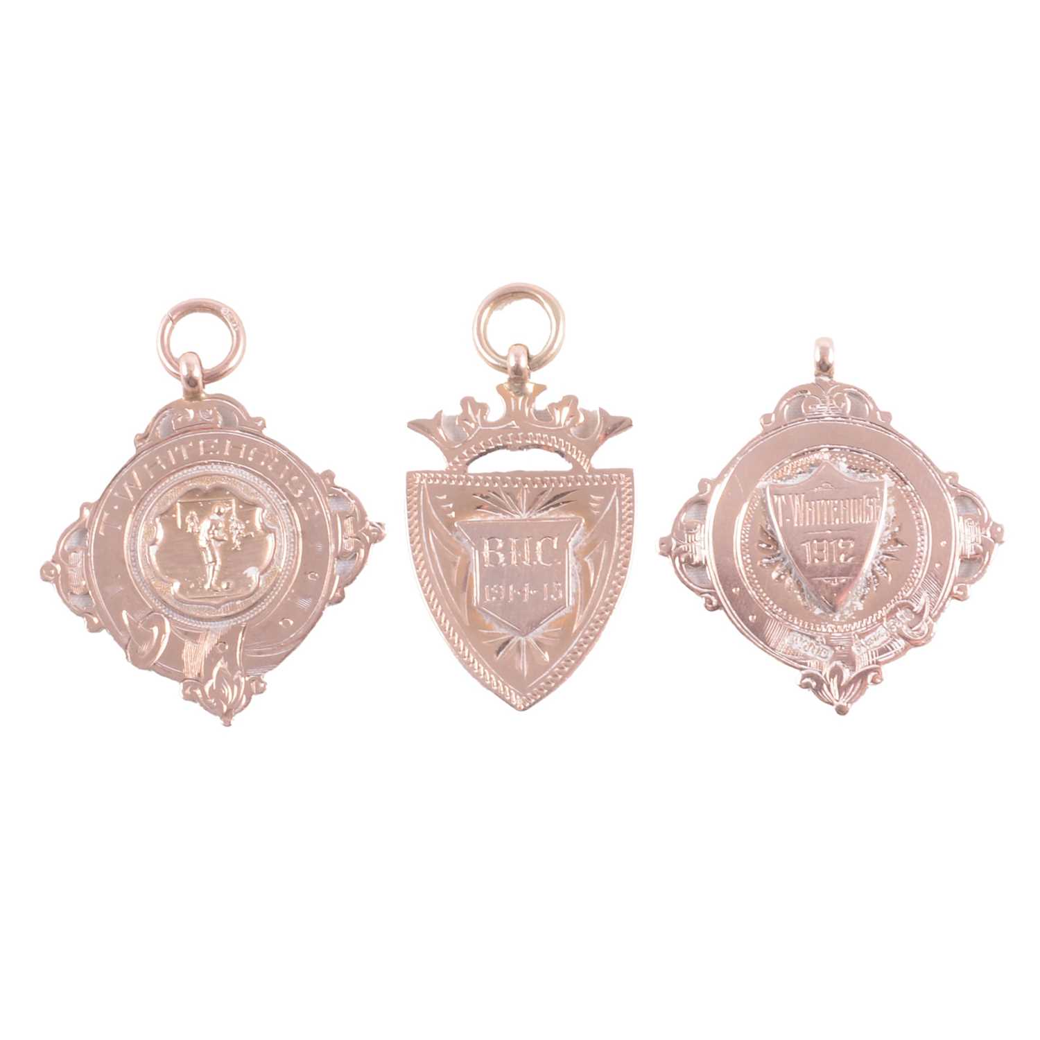 Lot 268 - Three 9ct gold fobs,