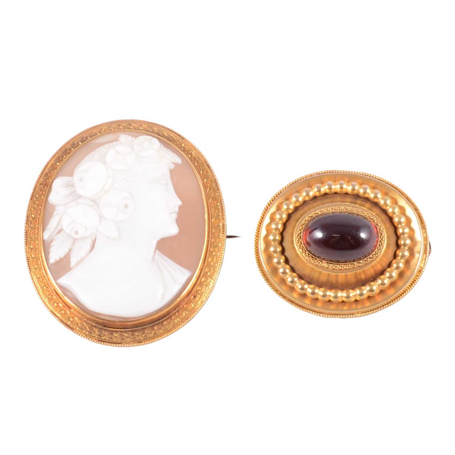Lot 194 - An oval carved shell cameo brooch, and a red