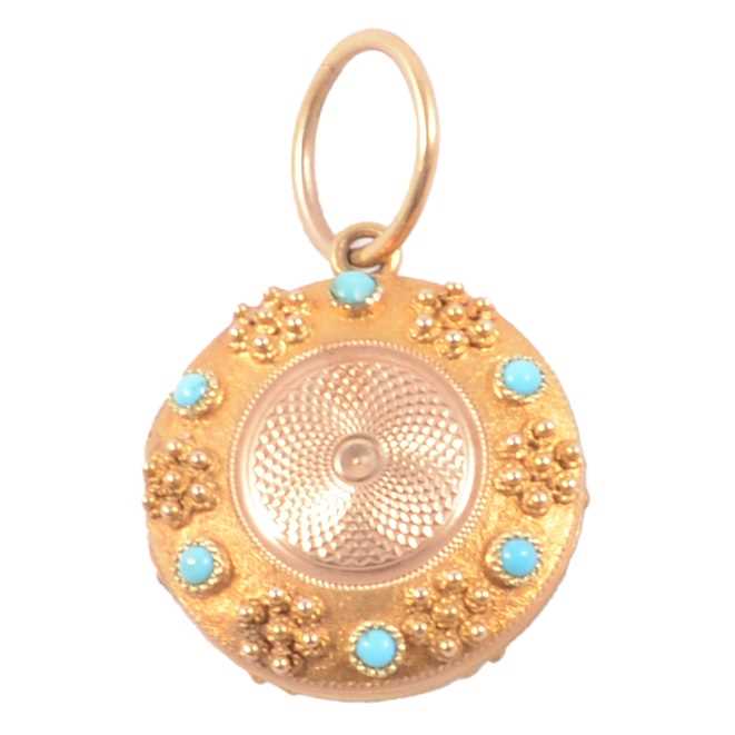 Lot 286 - A yellow metal and turquoise locket.