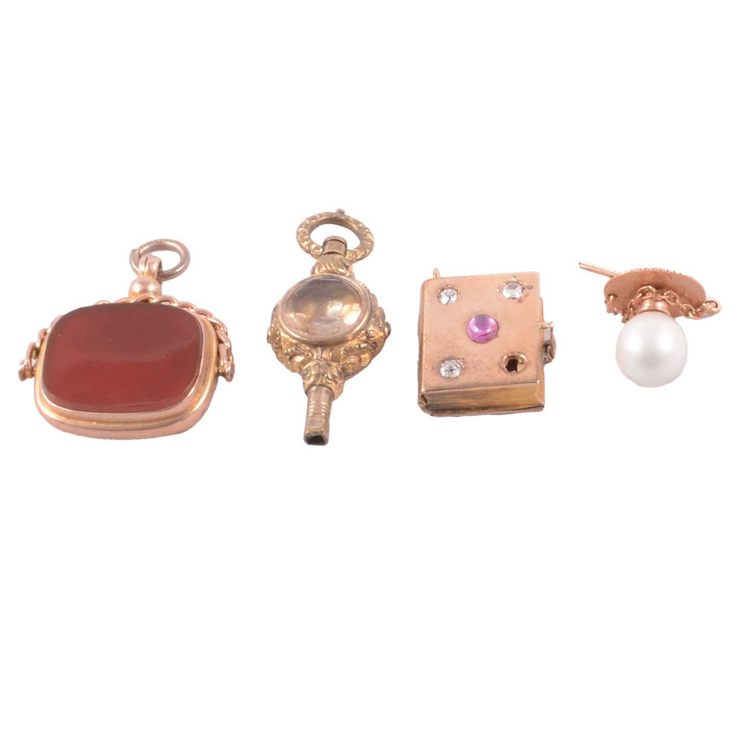Lot 360 - A cornelion fob, pearl tie stud, metal watch