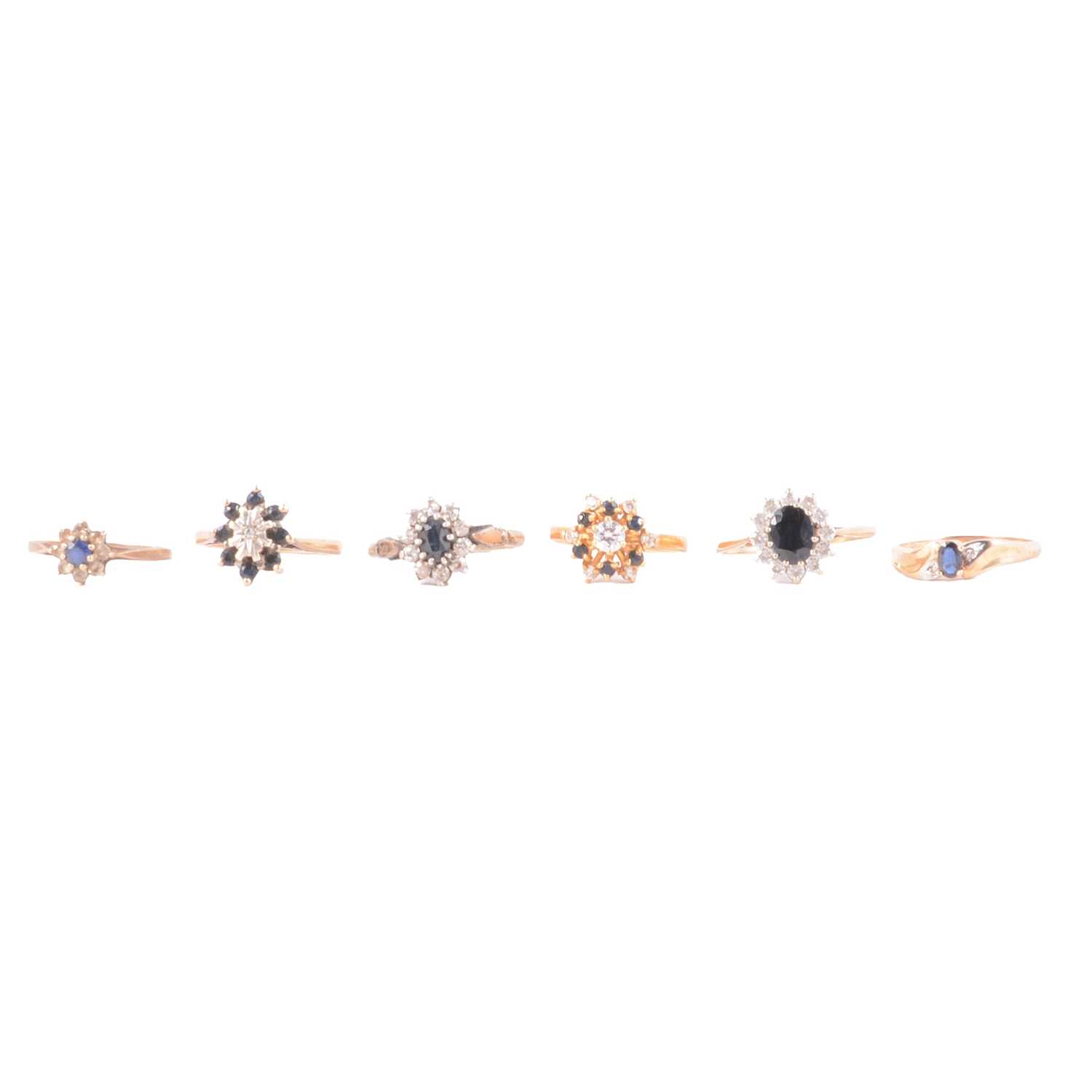 Lot 57 - Six sapphire rings.