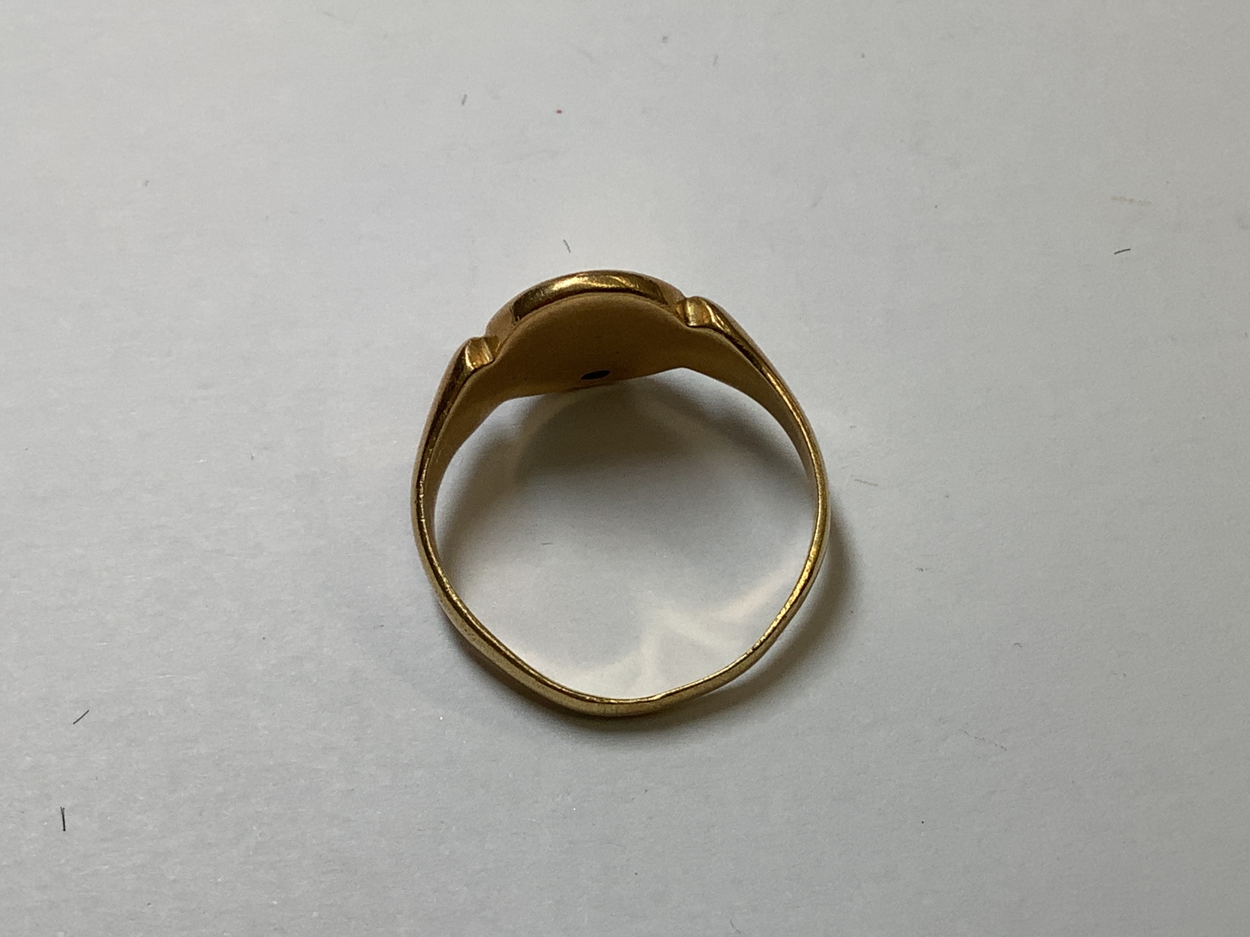 Lot 115 - A diamond set signet ring.