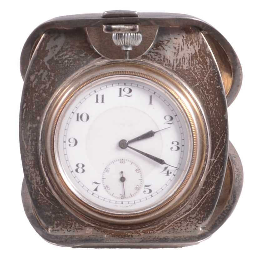 Lot 1158 - Tiffany - a silver cased travel clock,
