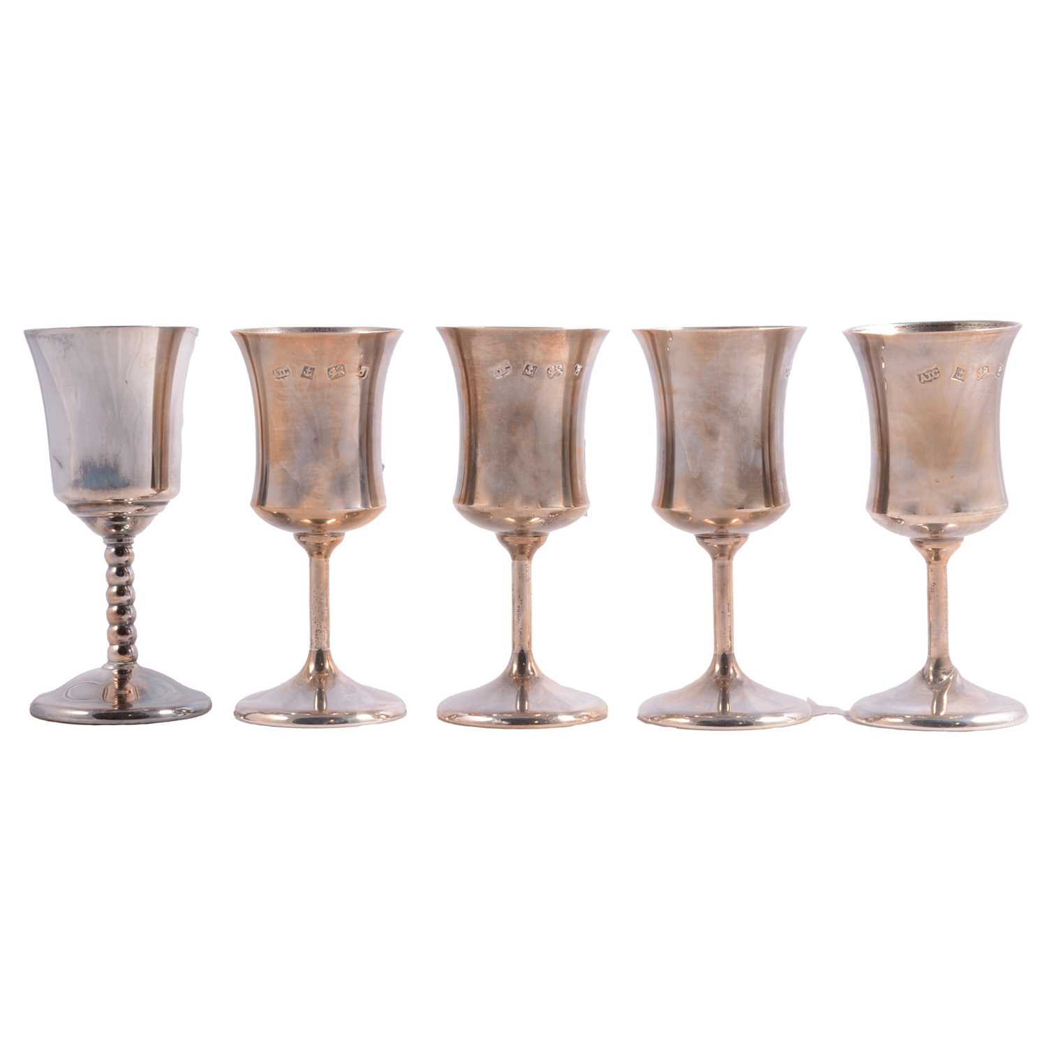 Lot 245 - Set of four silver goblets, and an