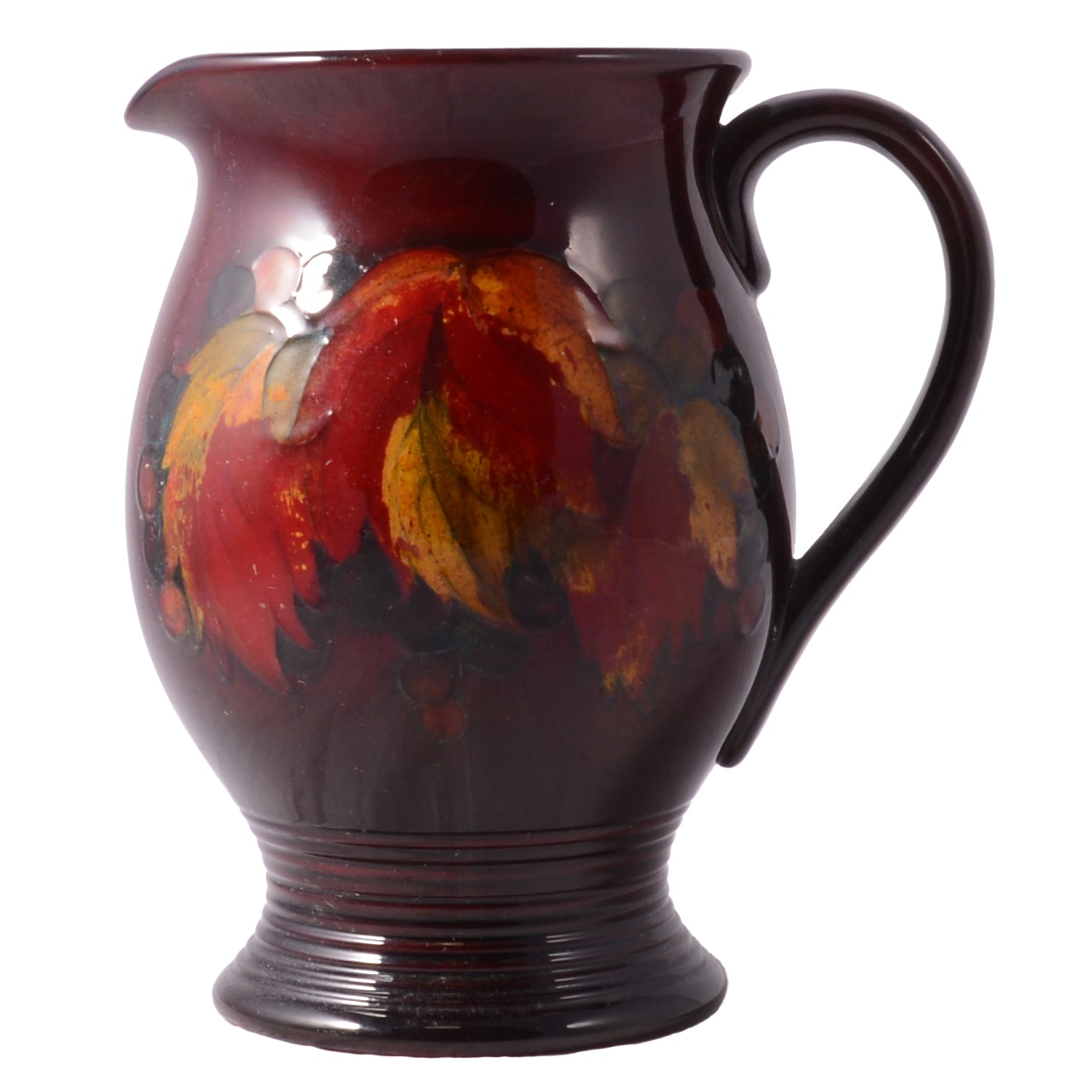 Lot 57 - Moorcorft Pottery, a 'Flambe Leaf and Berry'