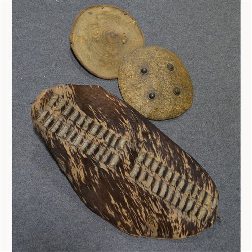 Lot 296 - Large African hide shield, wooden hull,