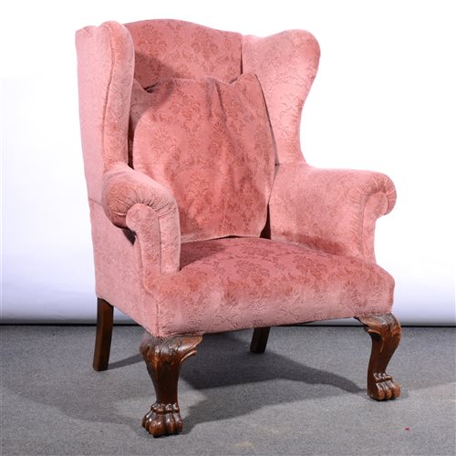 Lot 375 - Traditional wing-back easy chair.