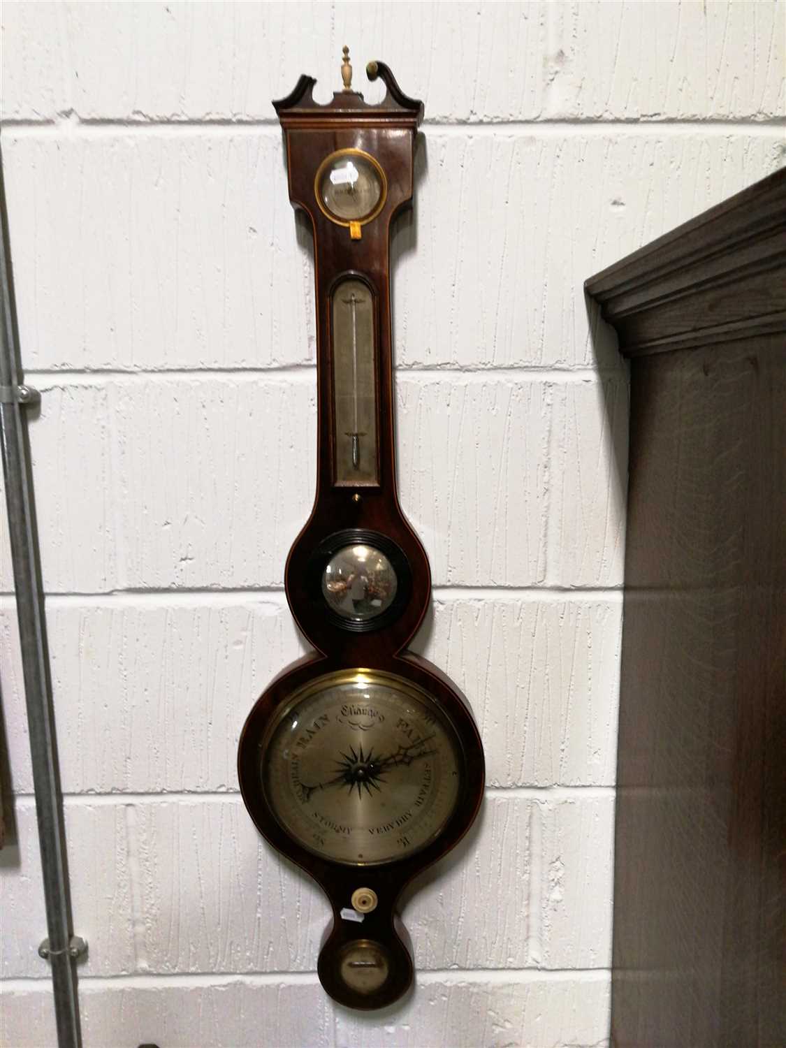Lot 559 - George IV mahogany banjo shape barometer,