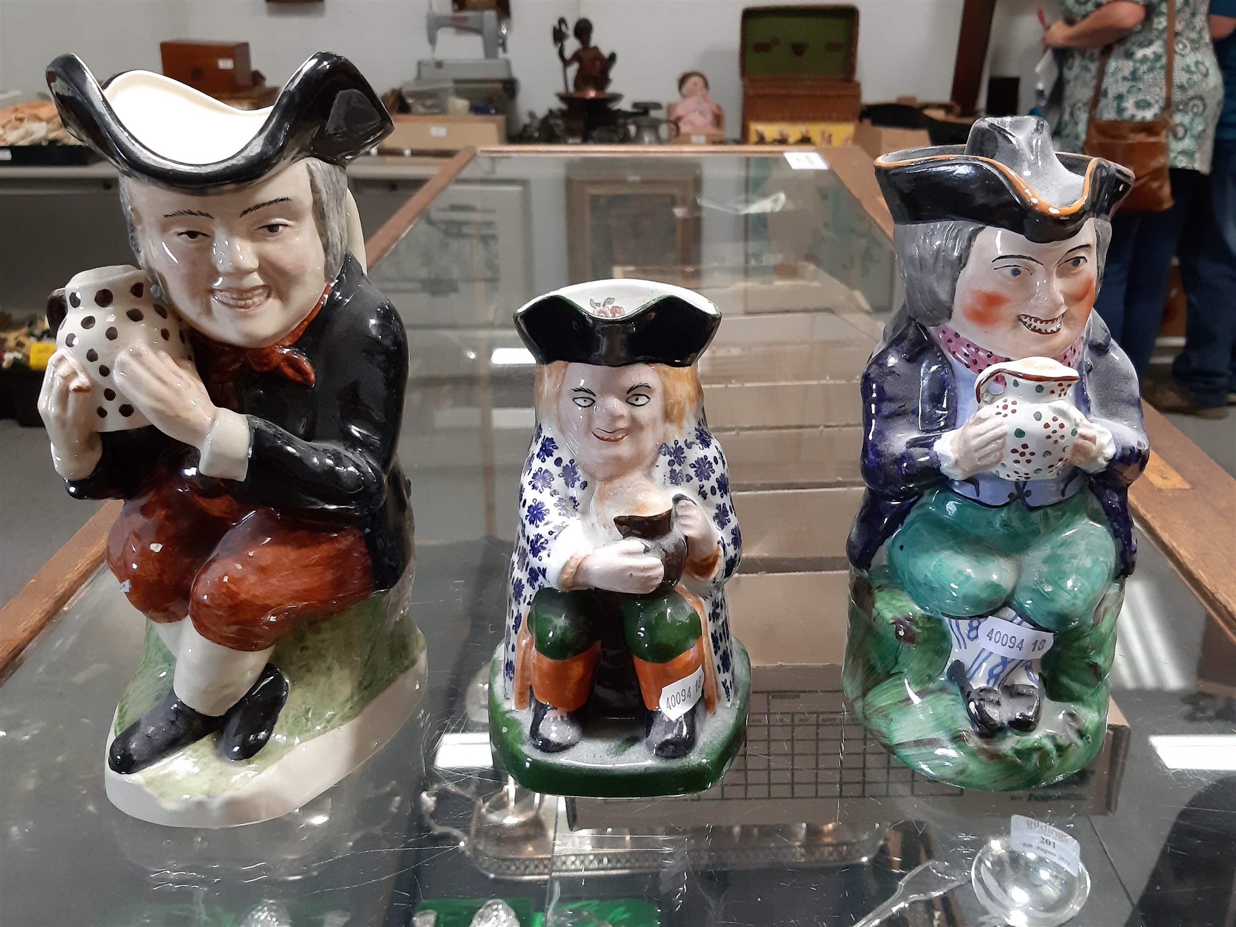 Lot 54 - Late Staffordshire Nelson Toby jug,
