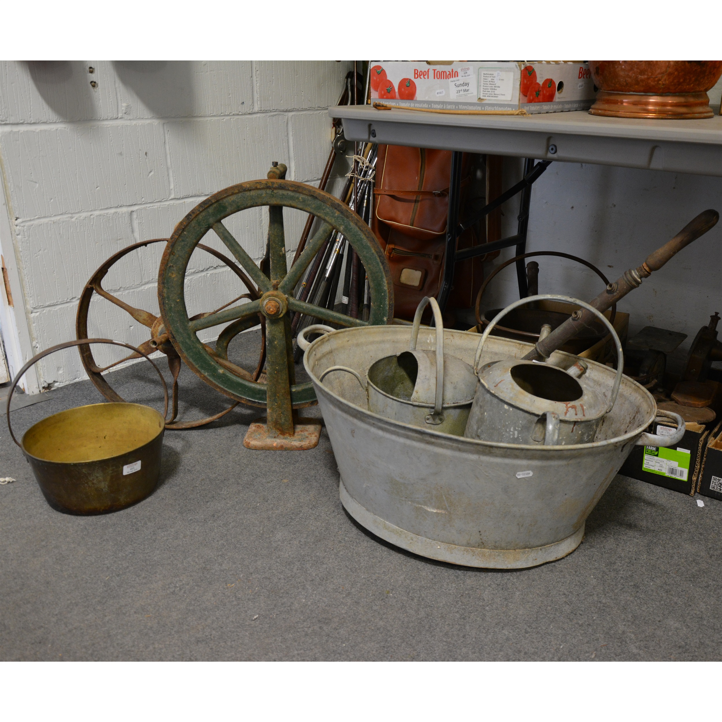 Lot 411 - Victorian treadle wheel, spare wheel,