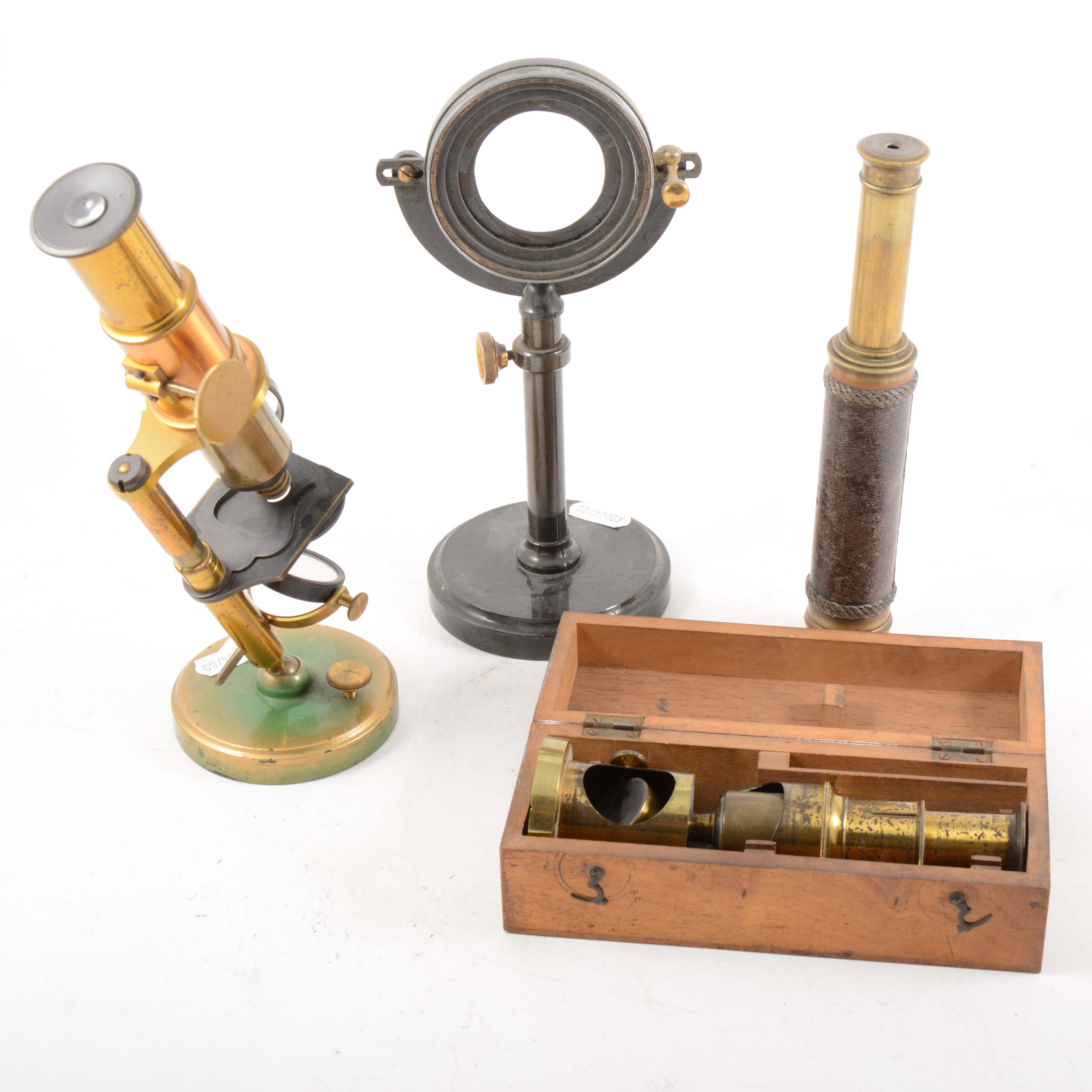 Lot 91 - A lacquered brass student microscope, field
