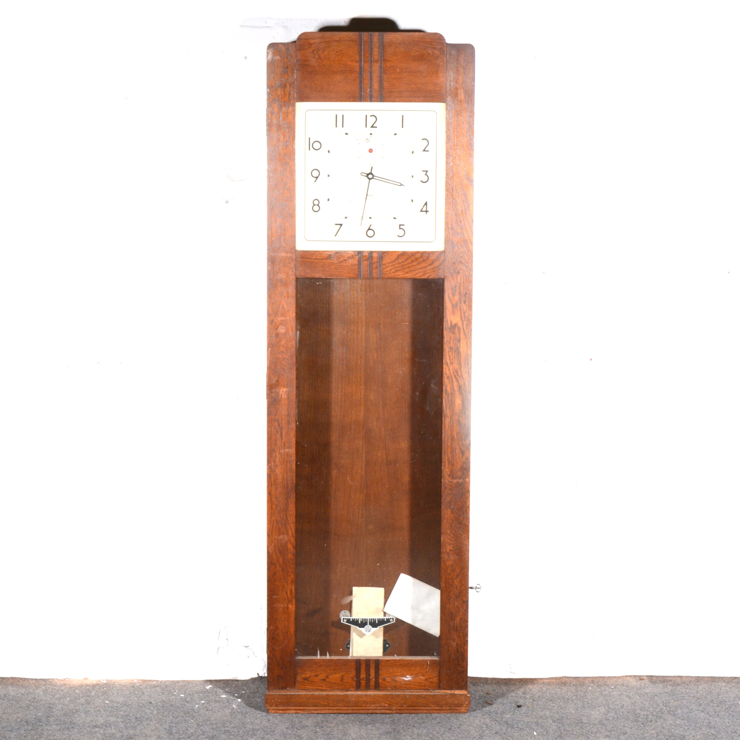 Lot 615 - IBM International, an oak cased master clock,