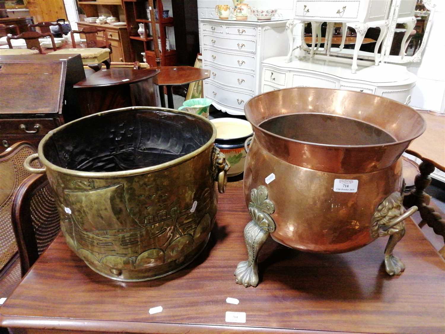 Lot 714 - A Dutch brass log bin,