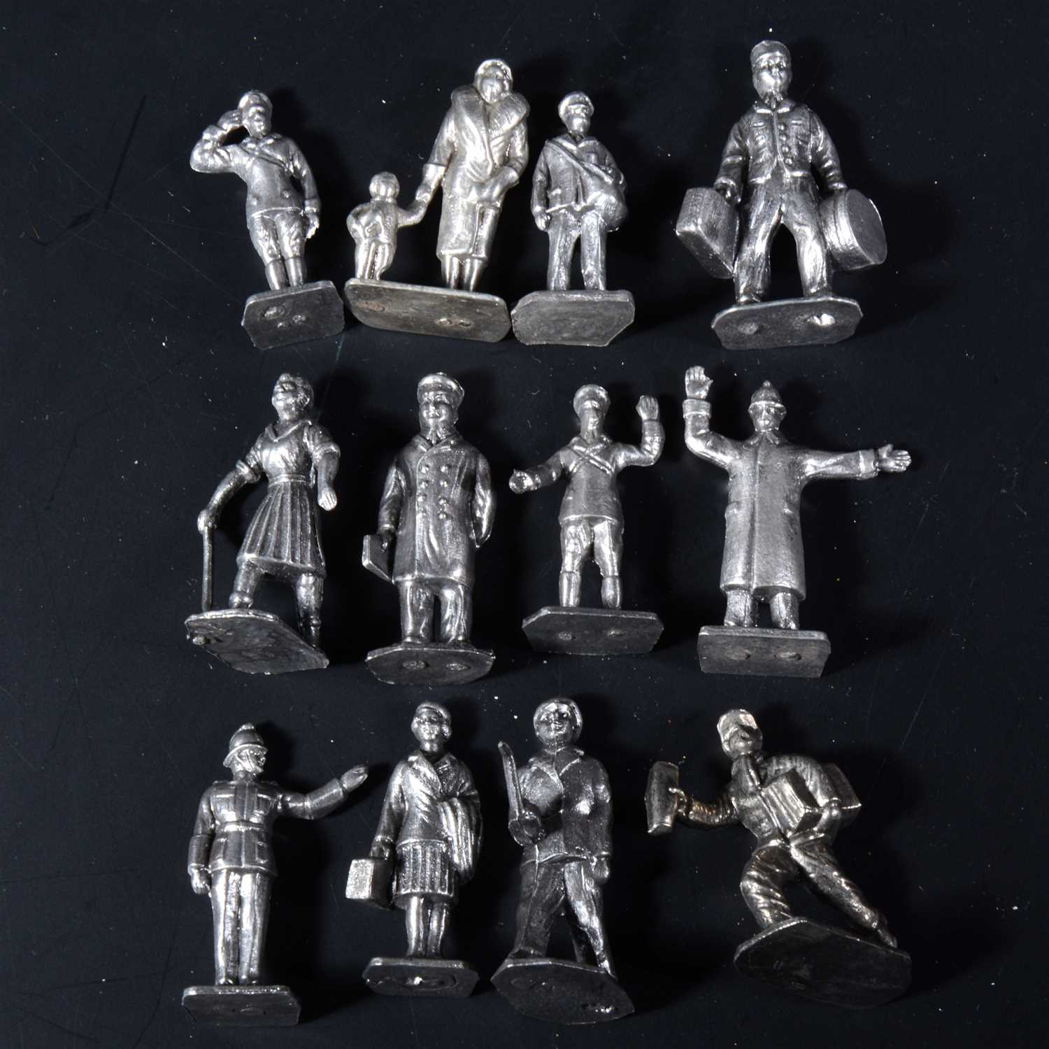 Lot 302 - A set of twelve pewter metal railway figures,