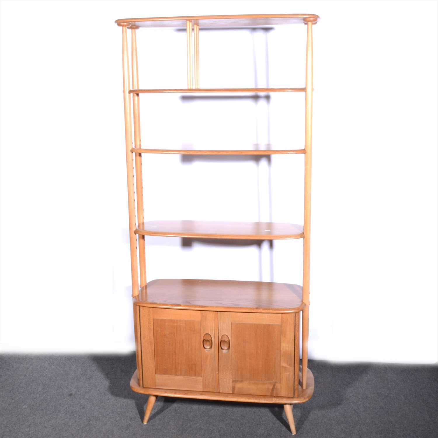 Lot 256 - A light elm and beech room divider by Ercol.