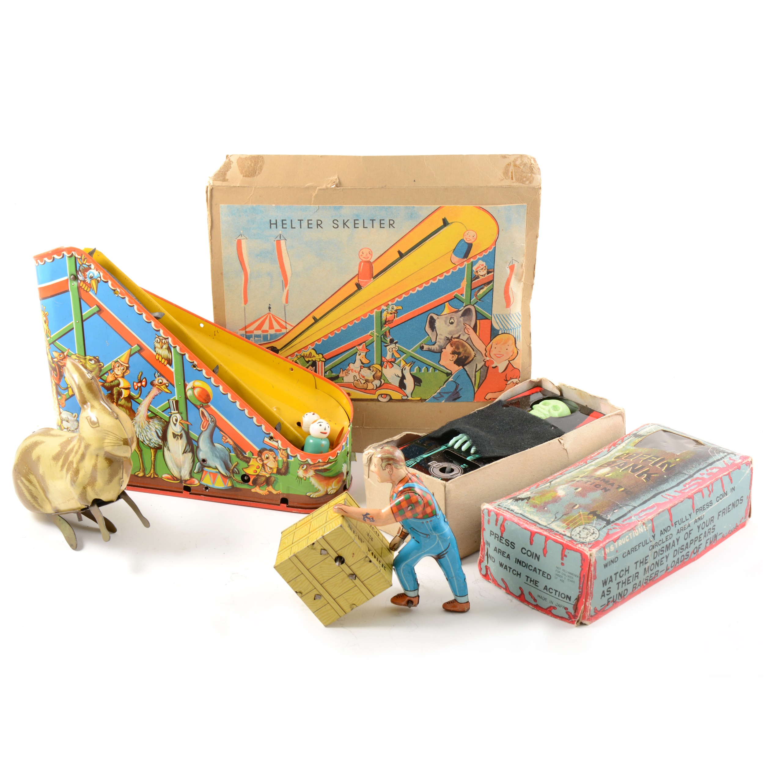 Lot 119 - Four tin-plate wind-up toys, including