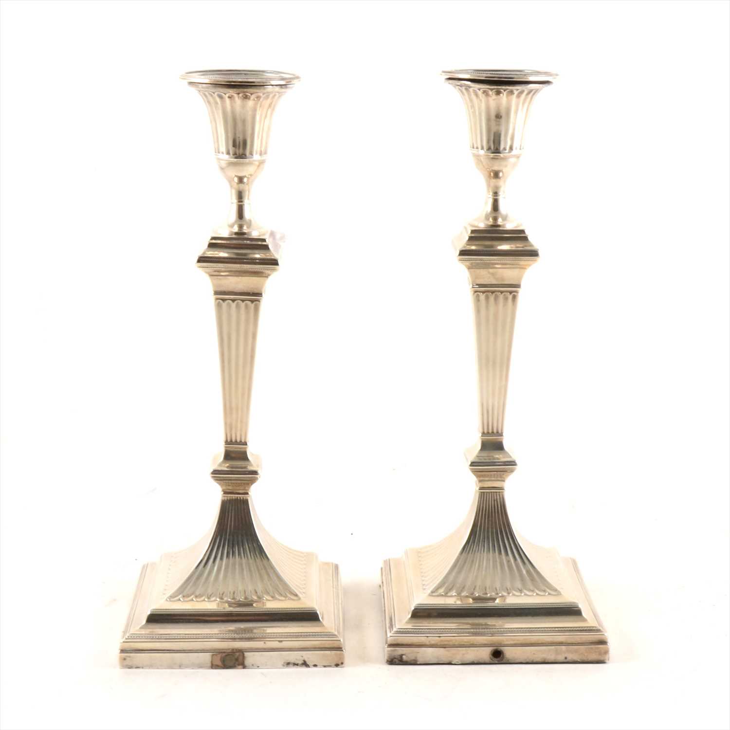 Lot 409 - A pair of silver candlesticks, William