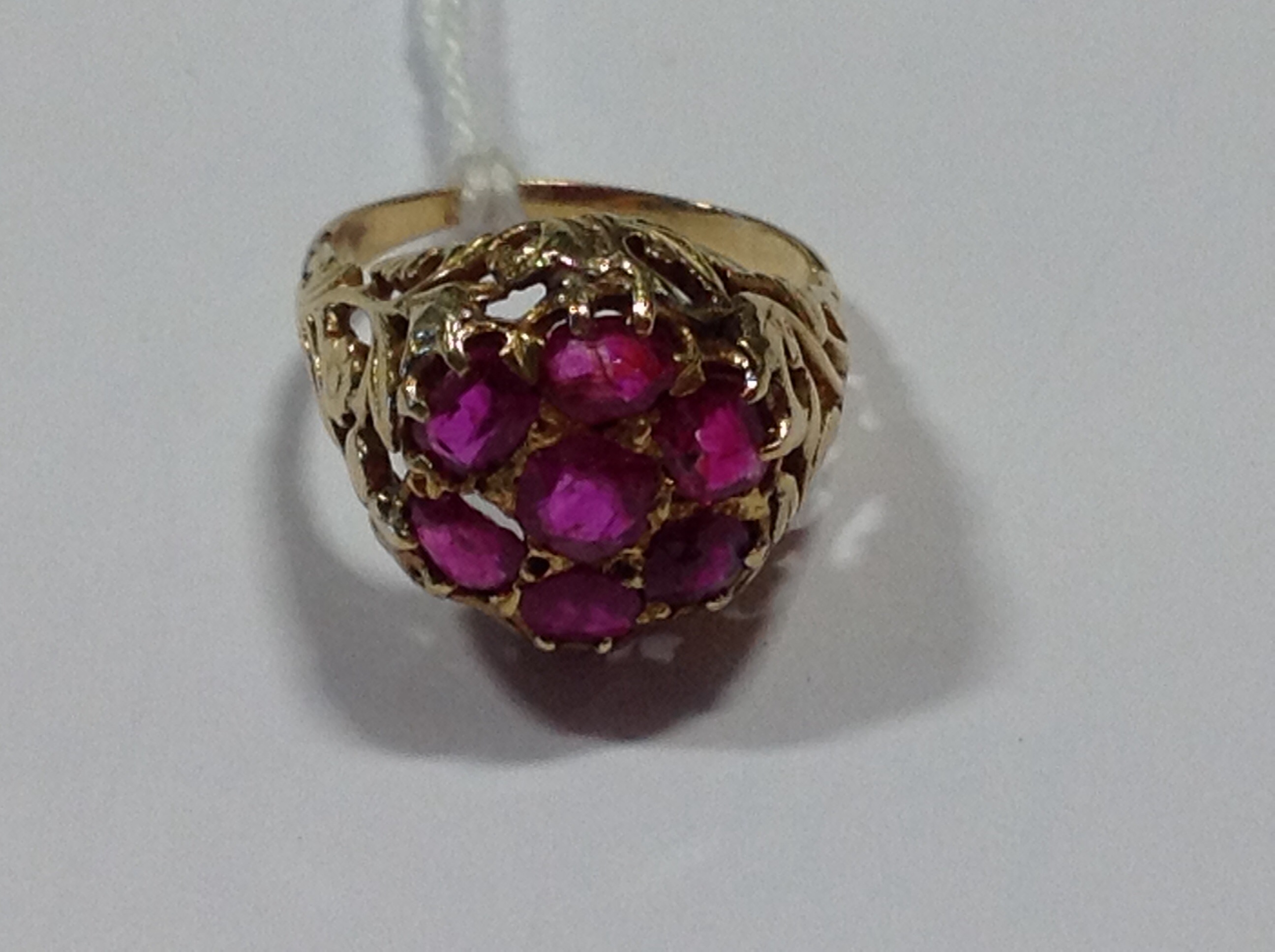 Lot 28 - A vintage ruby cluster ring.