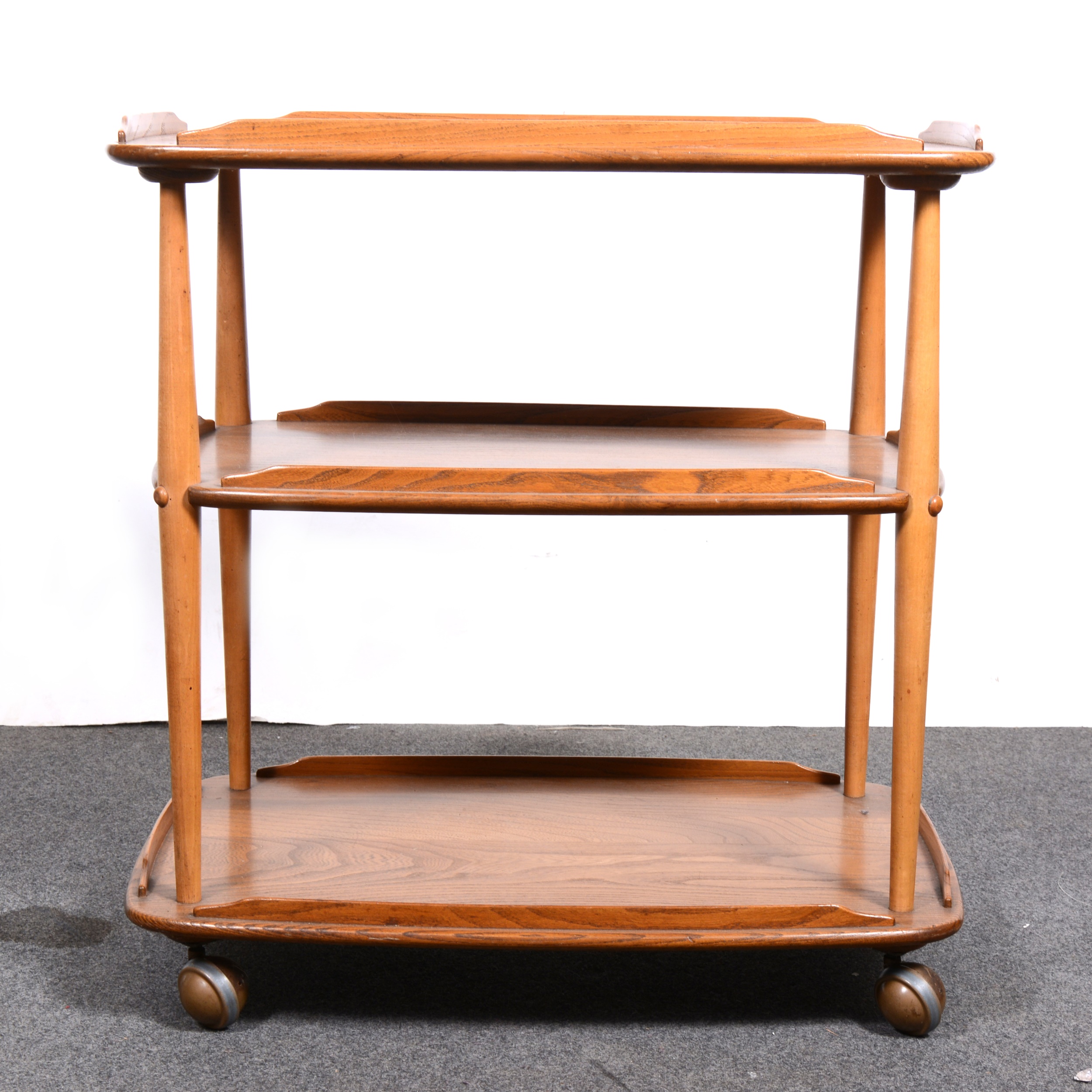 Lot 2 - An Ercol three-tier dinner trolley