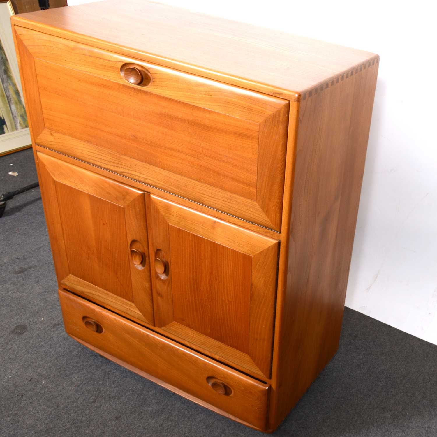 Lot 3 - An Ercol serving cabinet