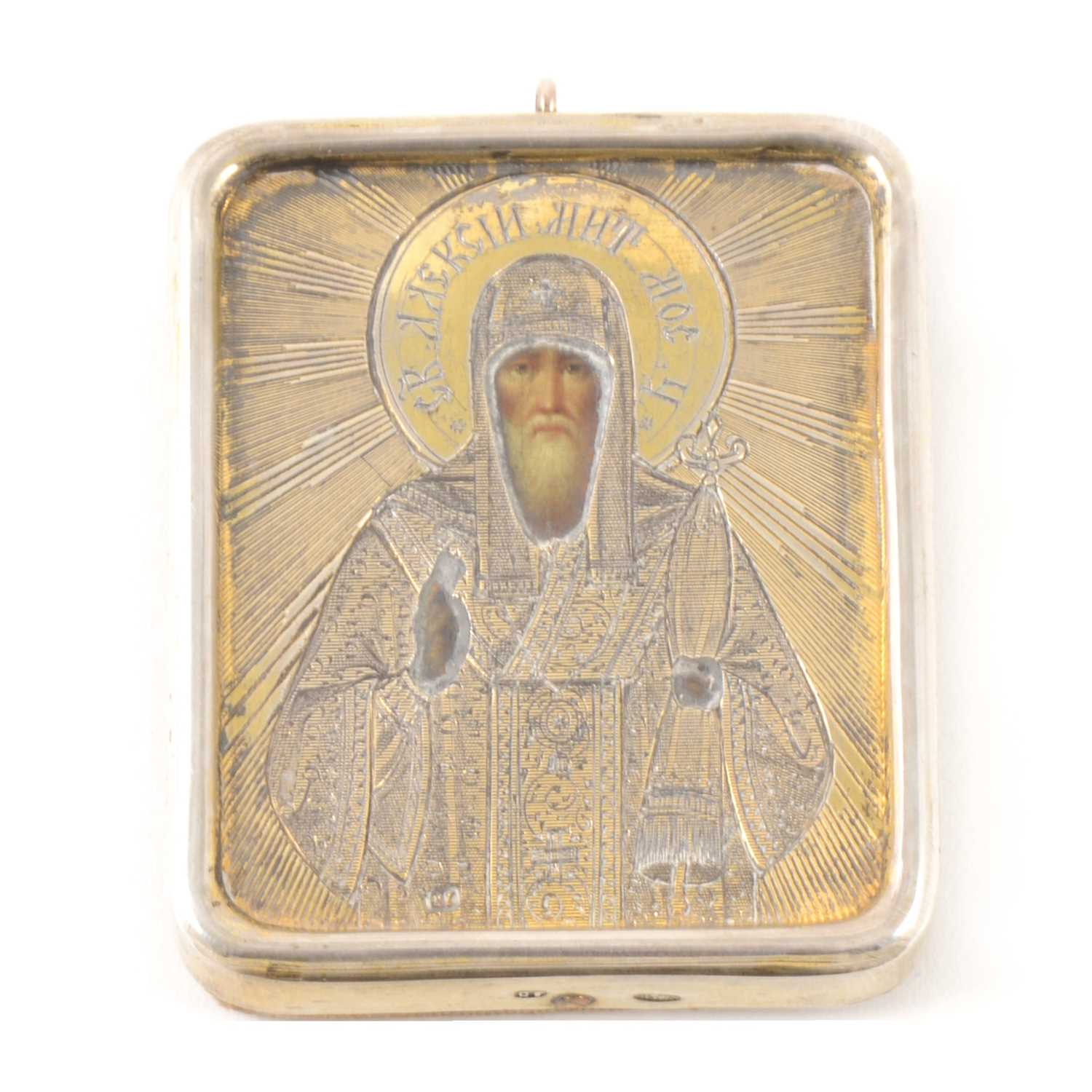 Lot 324 - A small Russian silver-covered icon of Saint