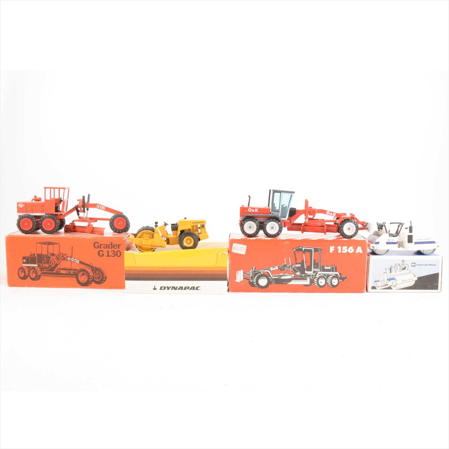 Lot 228 - Four die-cast construction models, NZG O&K