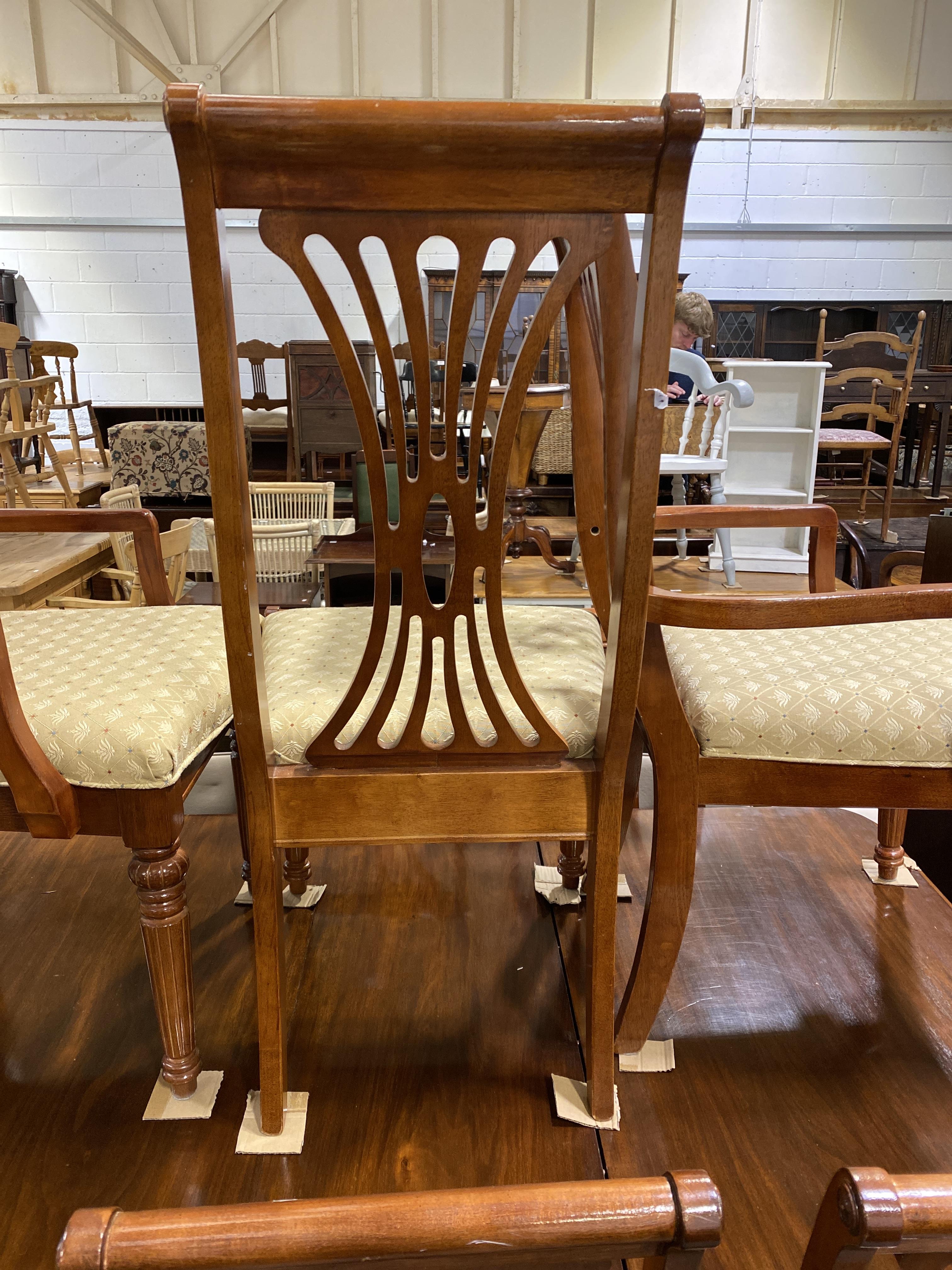 Lot 41 - Victorian mahogany pull-out dining table, and