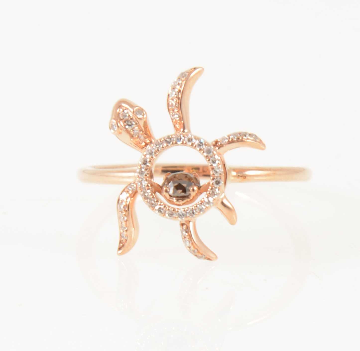 Lot 1258 - A diamond set "Floating Turtle" ring.