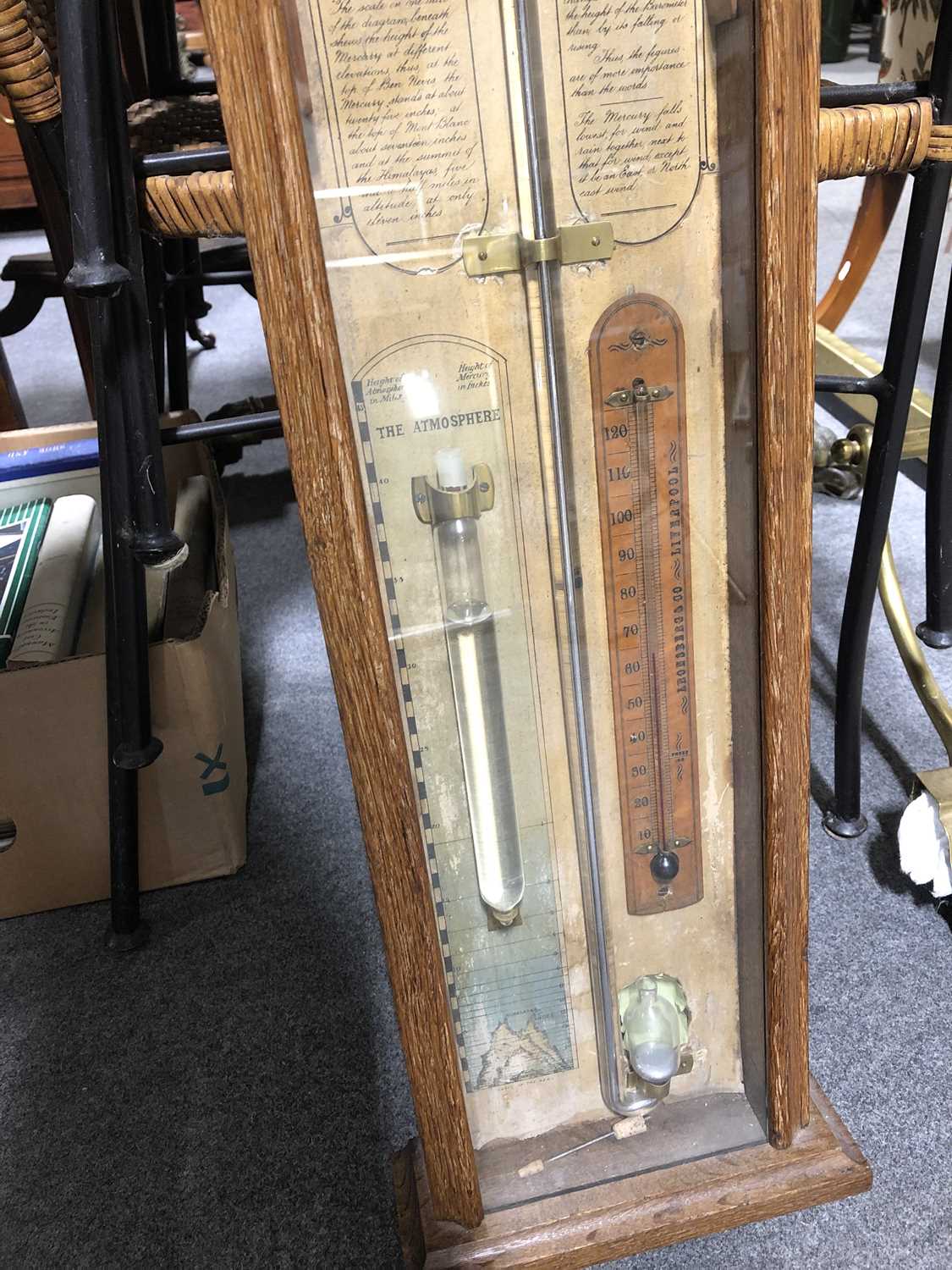 Lot 522 - An oak cased Admiral Fitzroy barometer,