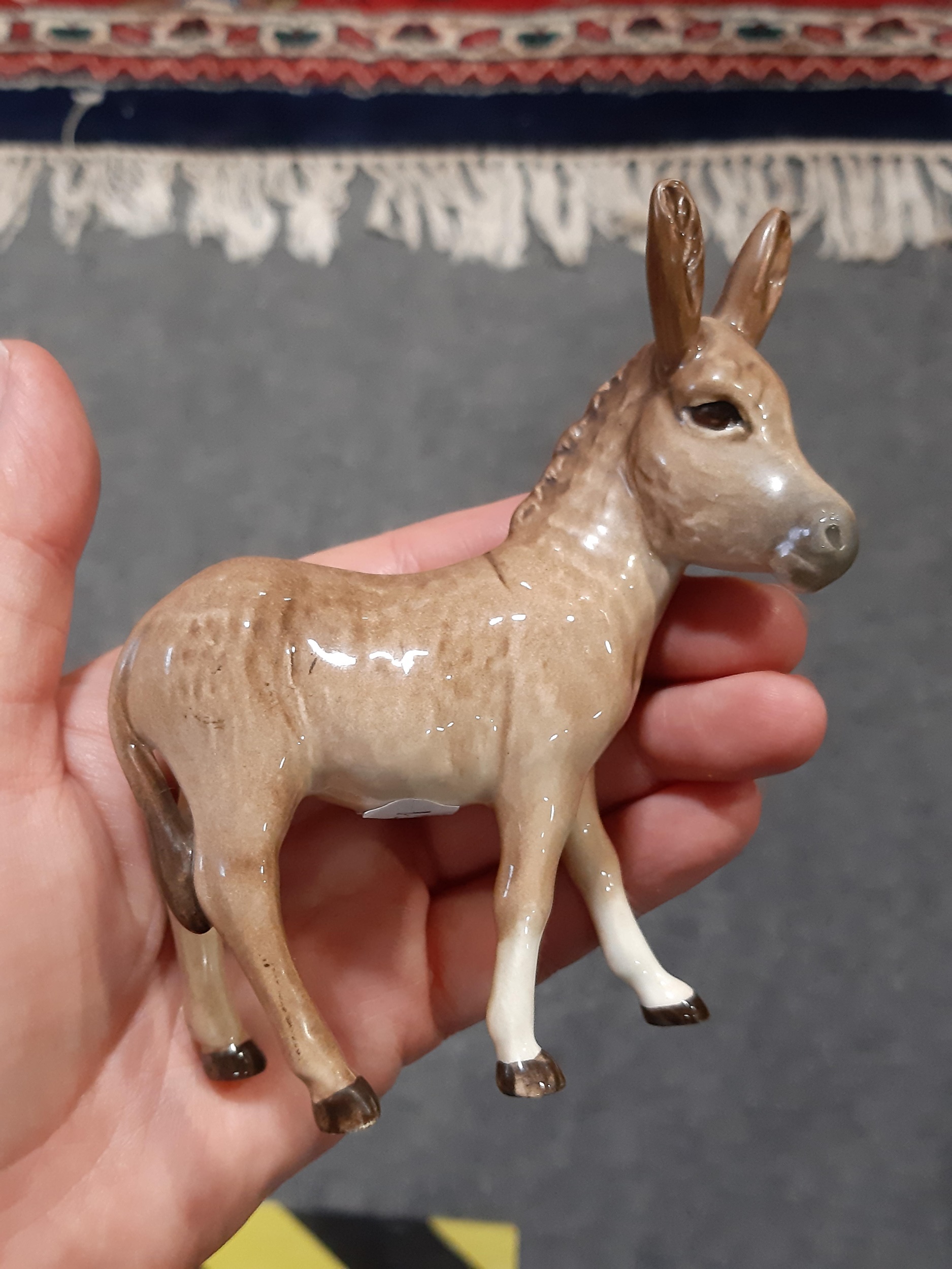 Lot 107 - Seven Beswick donkey figurines