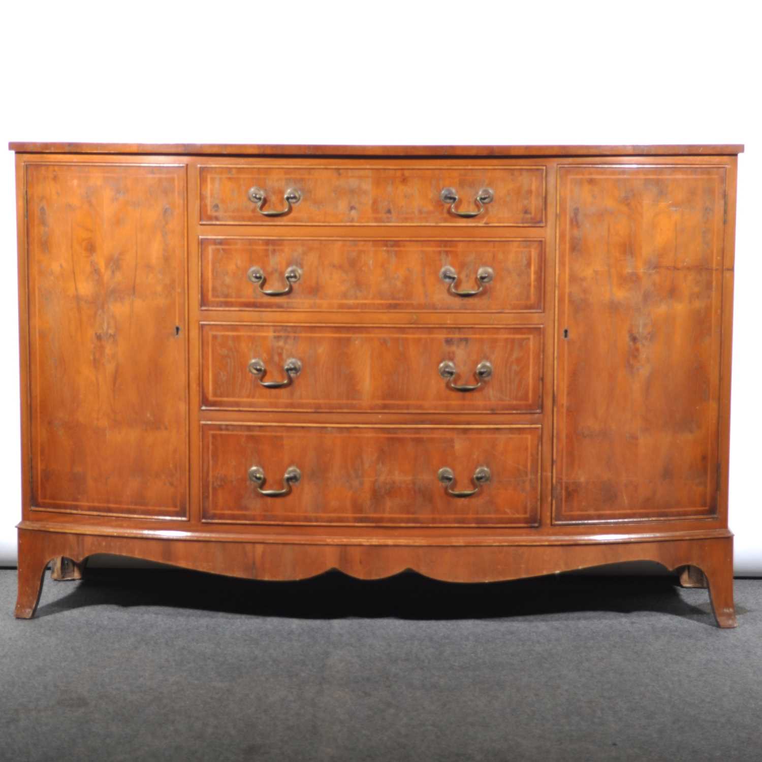 Lot 575 - Reproduction yew wood bowfront sideboard,