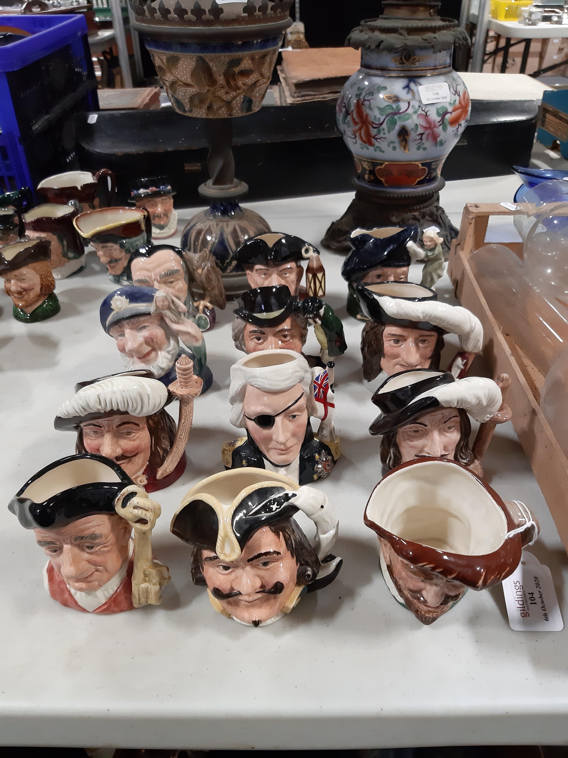 Lot 104 - Twelve Royal Doulton character jugs