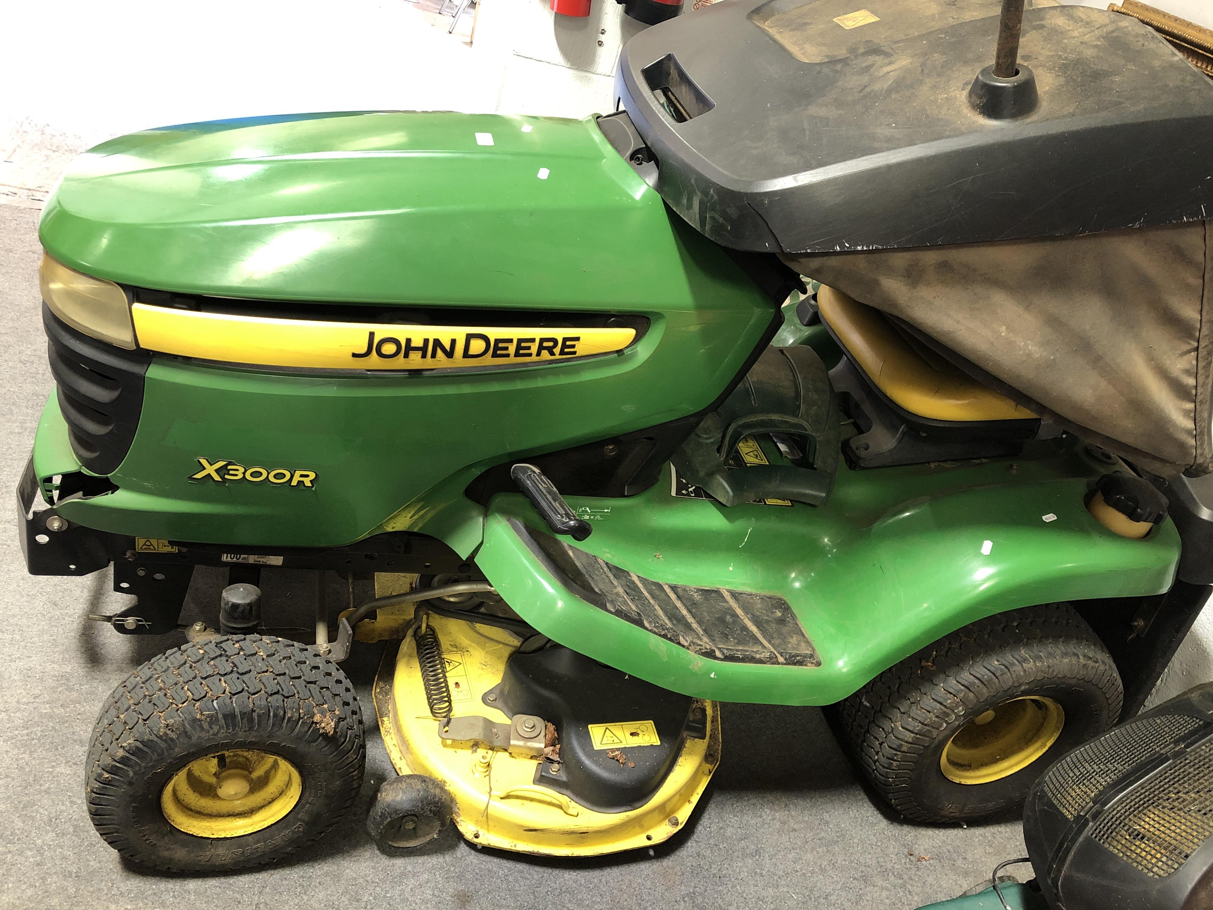 Lot 669 - John Deere X300R ride on tractor mower, with