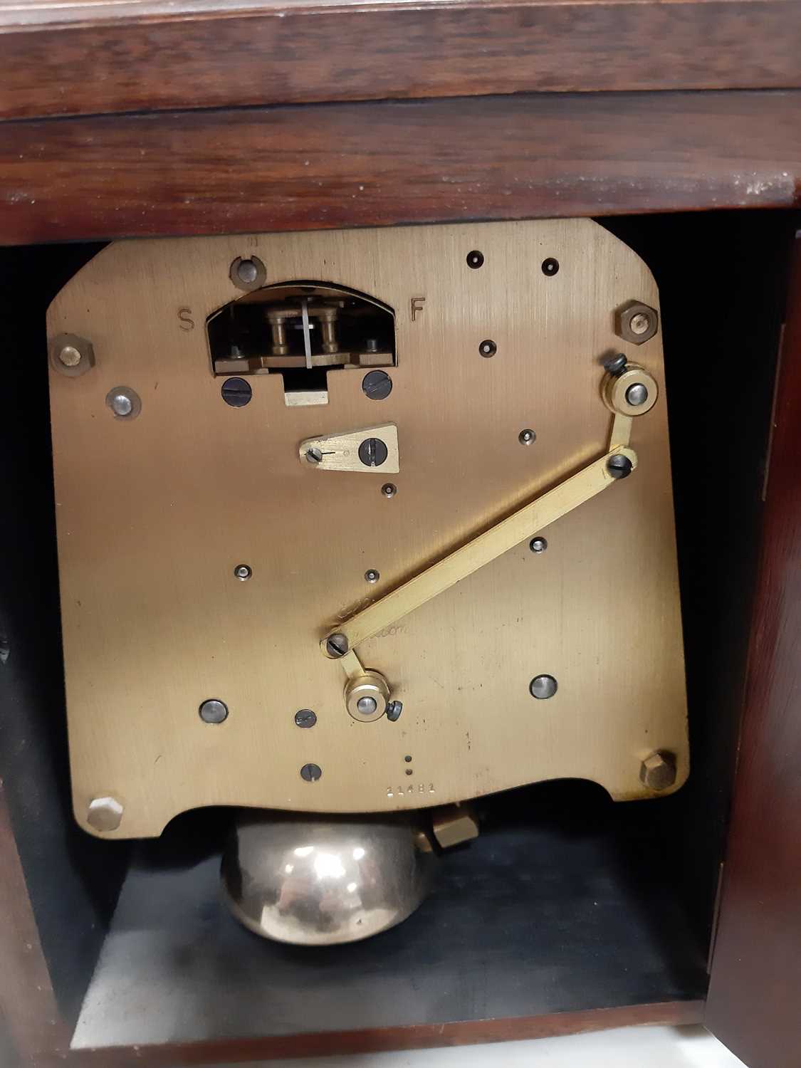 Lot 124 - An Elliott walnut mantel clock