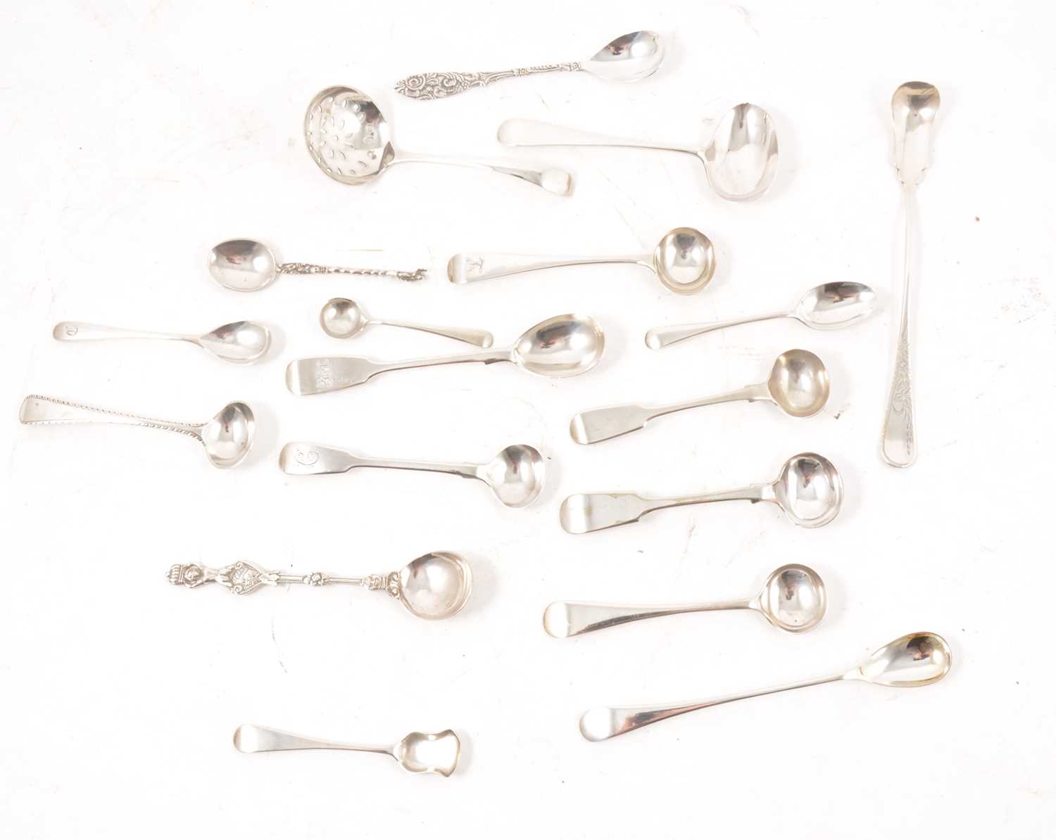 Lot 290 - A collection of silver condiment spoons.