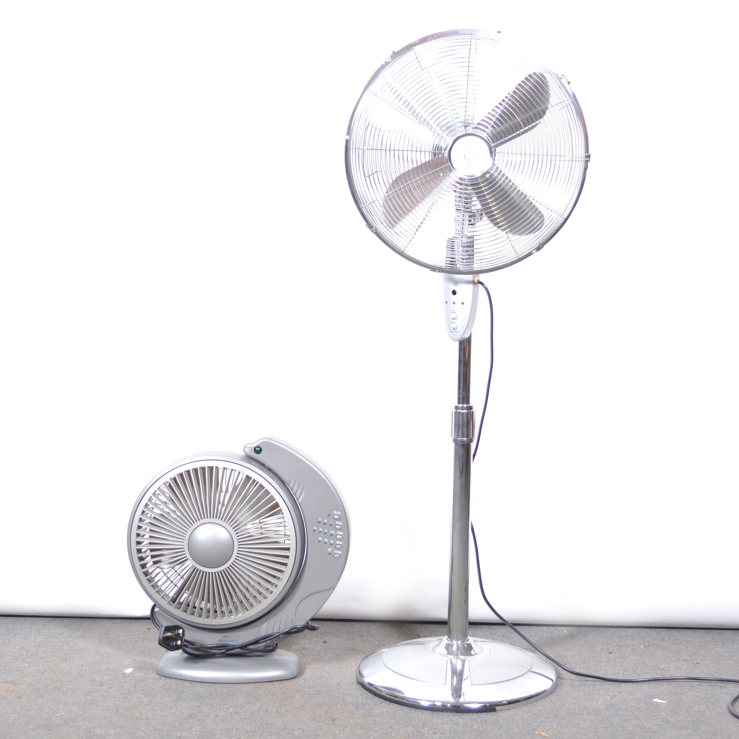 Lot 103 - Stainless steel standing electric fan, and