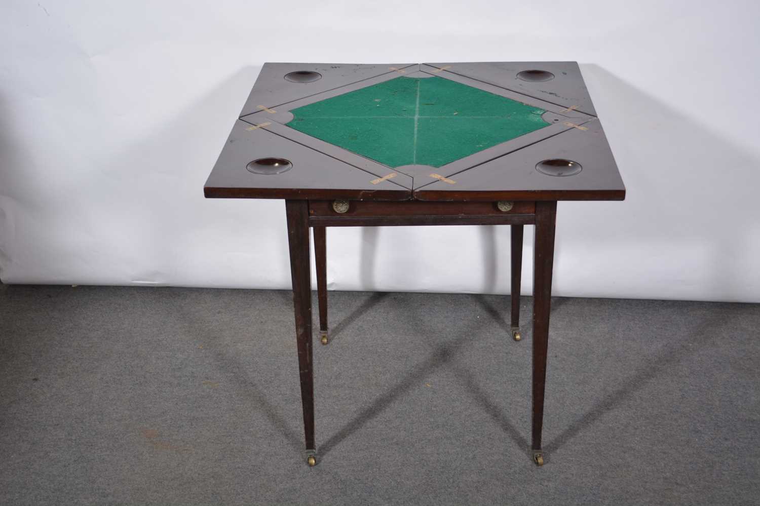 Lot 527 - Edwardian mahogany envelope-top card table,