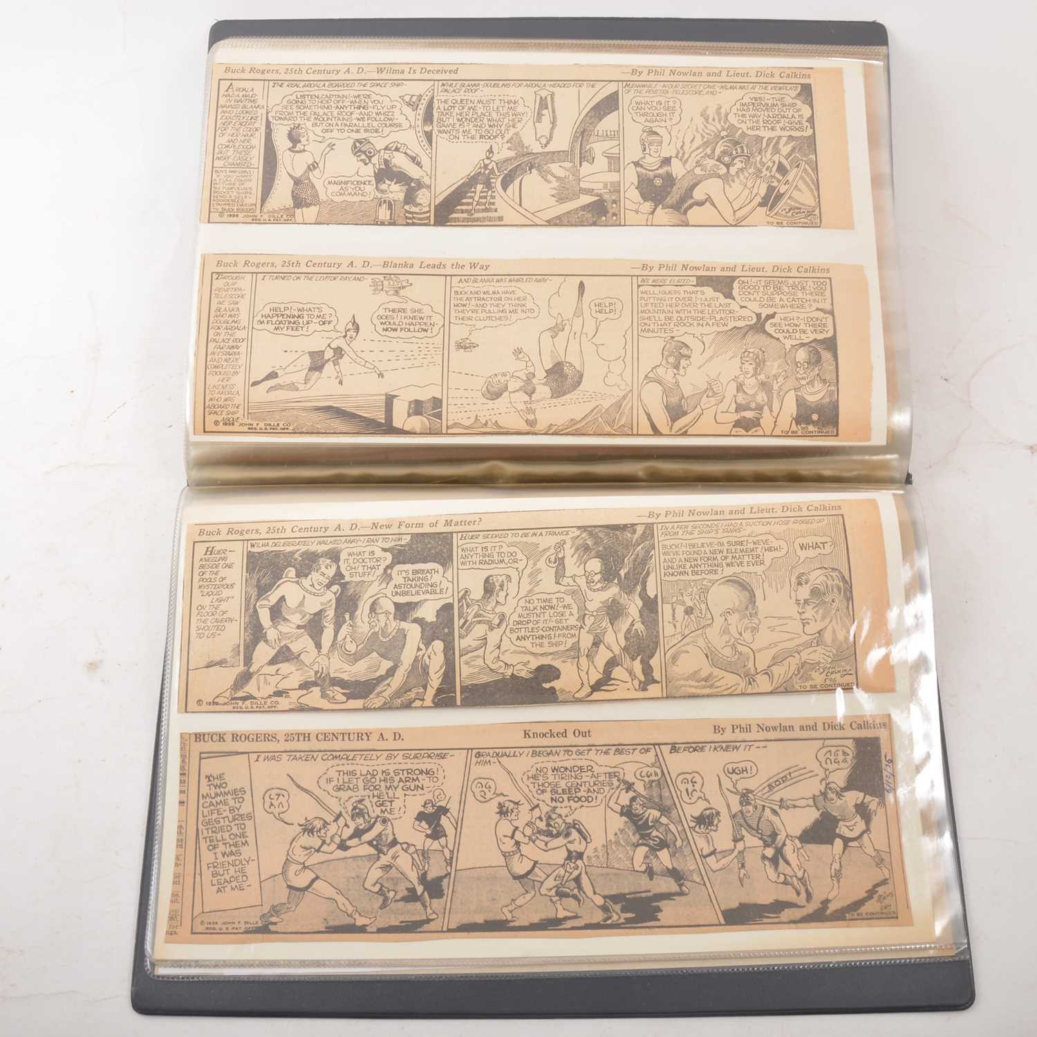 Lot 36 - A folder of John Dille co Buck Rogers Daily