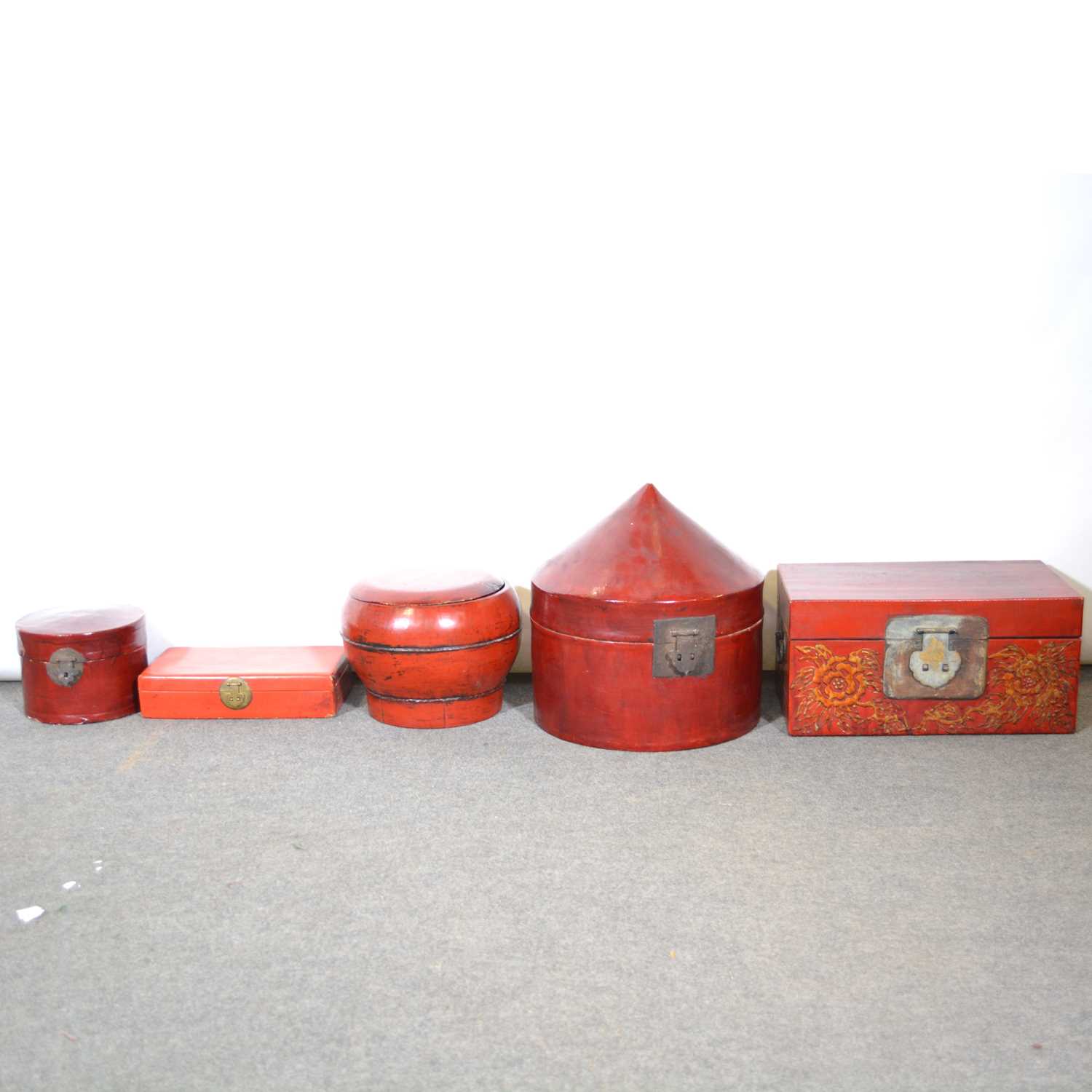 Lot 192 - Five red lacquered Chinese boxes/ trunks,