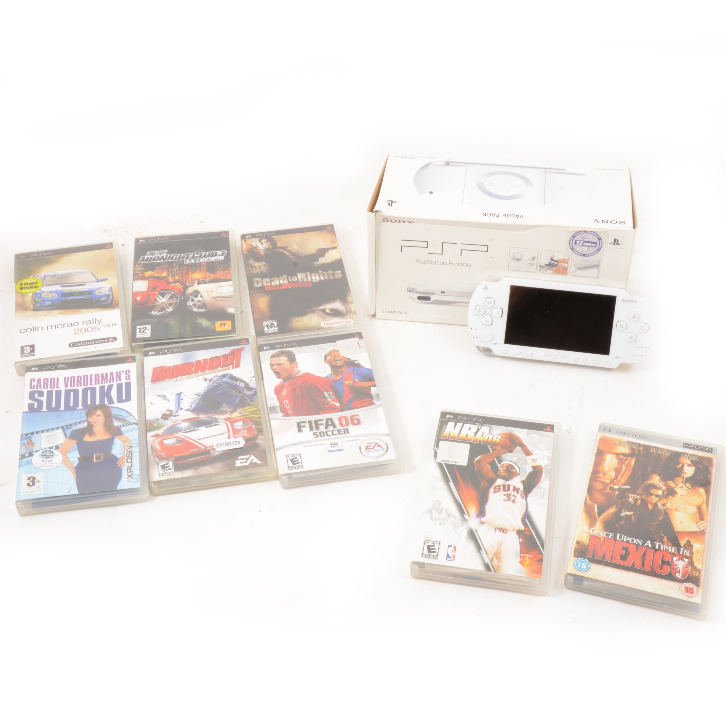 Lot 6 - Sony PSP handheld games console and games.